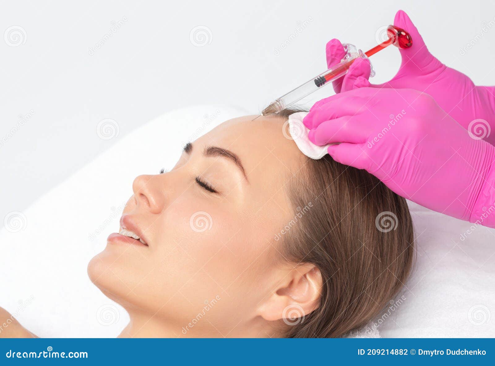 Cosmetologist Makes Rejuvenating Anti Wrinkle Injections On The Face Of