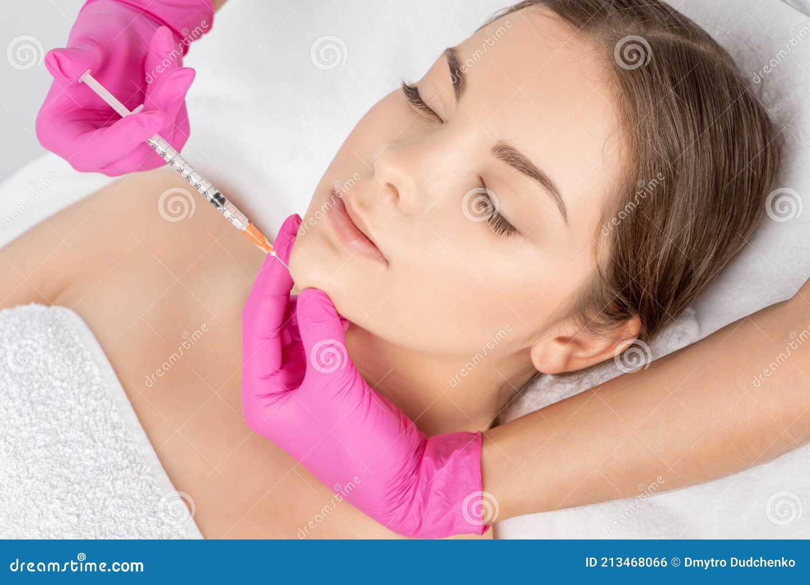 Cosmetologist Makes Rejuvenating Anti Wrinkle Injections On The Face Of