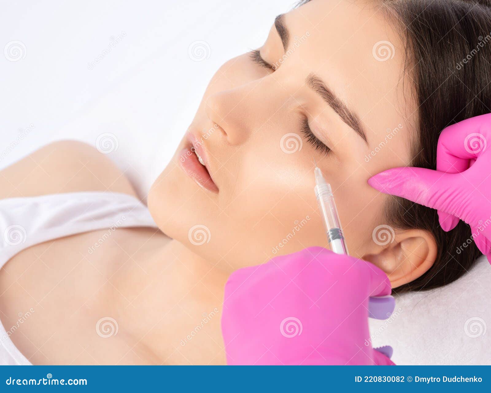Cosmetologist Makes Rejuvenating Anti Wrinkle Injections On The Face Of