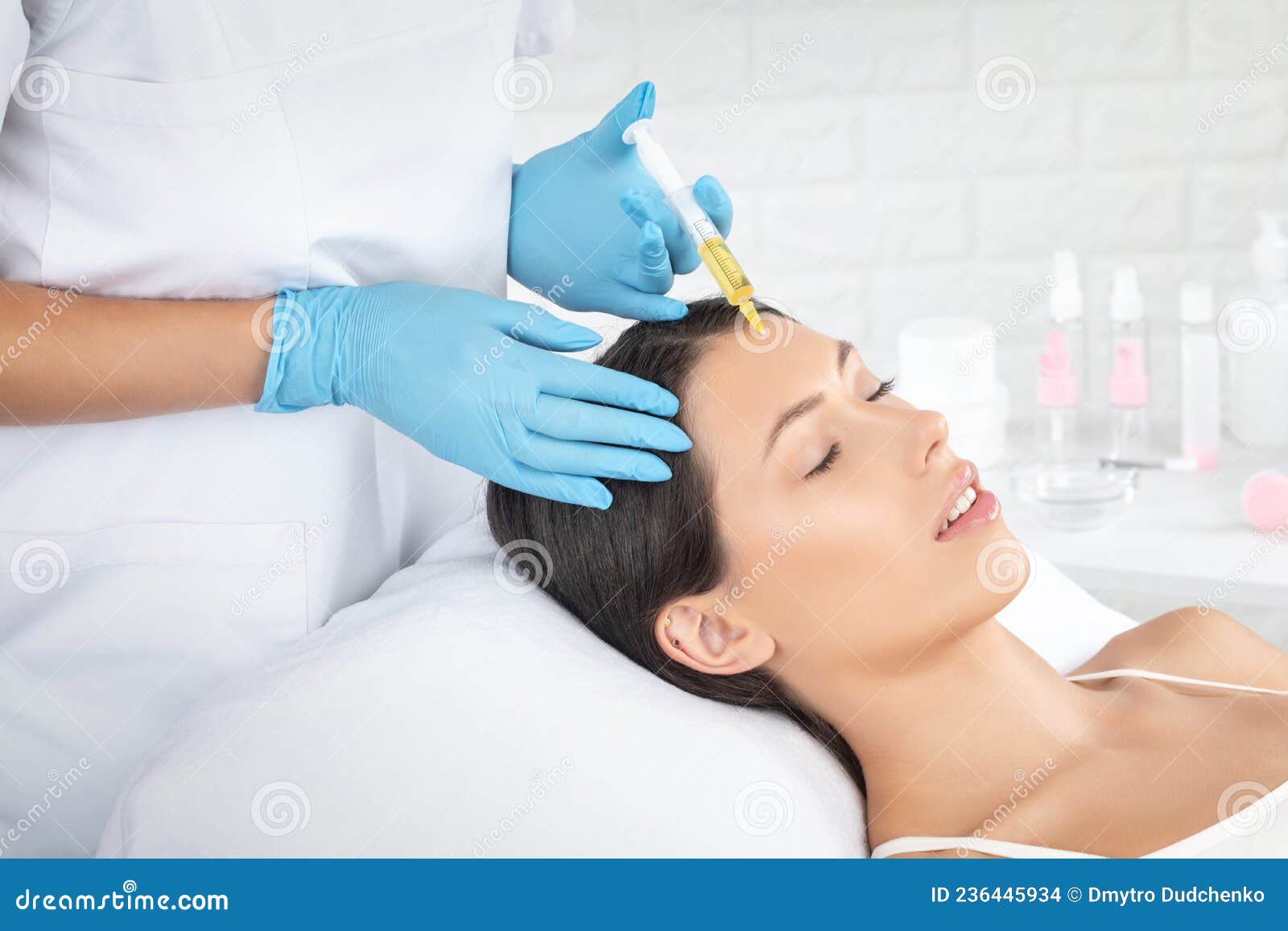 Cosmetologist Makes Rejuvenating Anti Wrinkle Injections On The Face Of