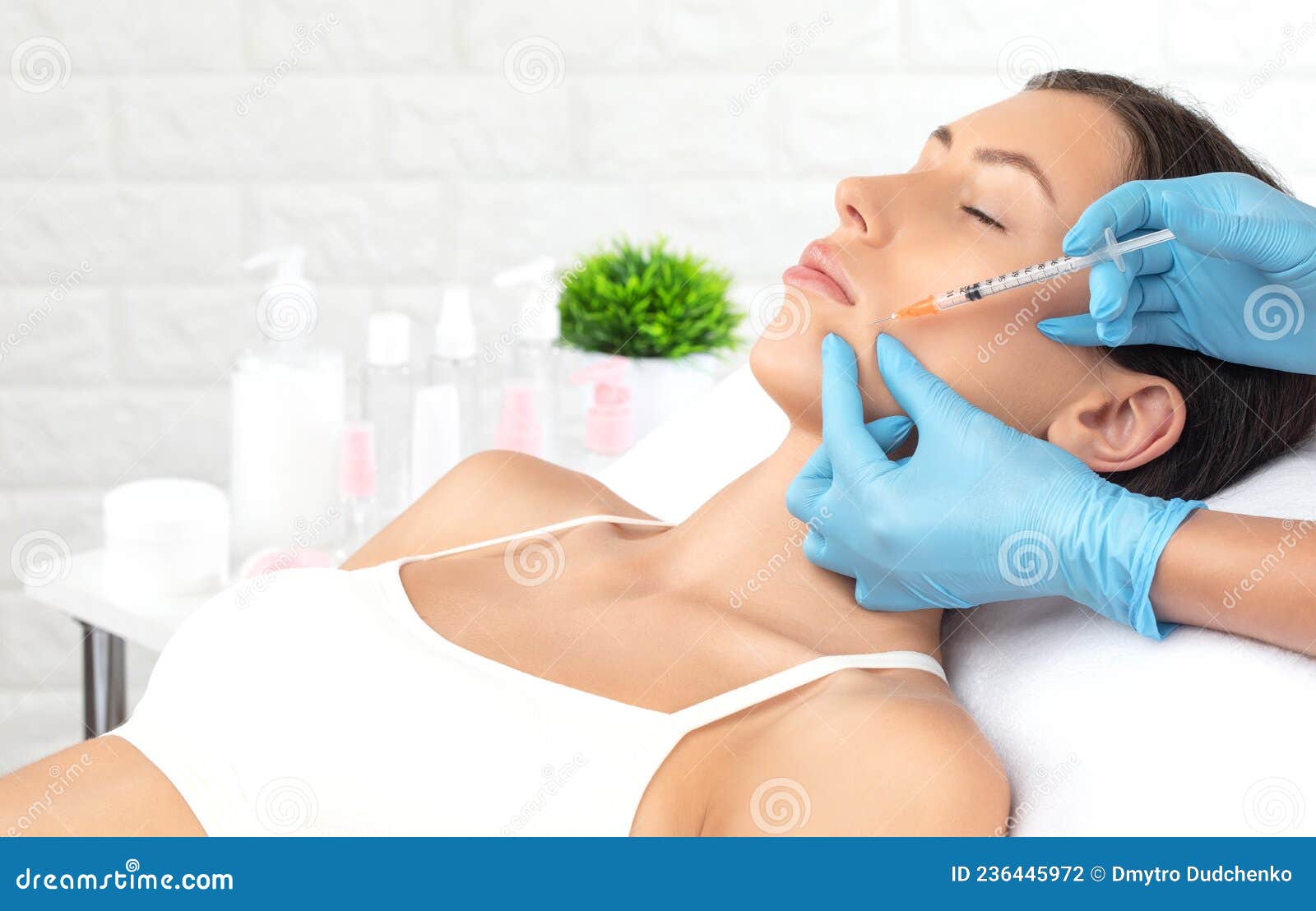 Cosmetologist Makes Rejuvenating Anti Wrinkle Injections On The Face Of