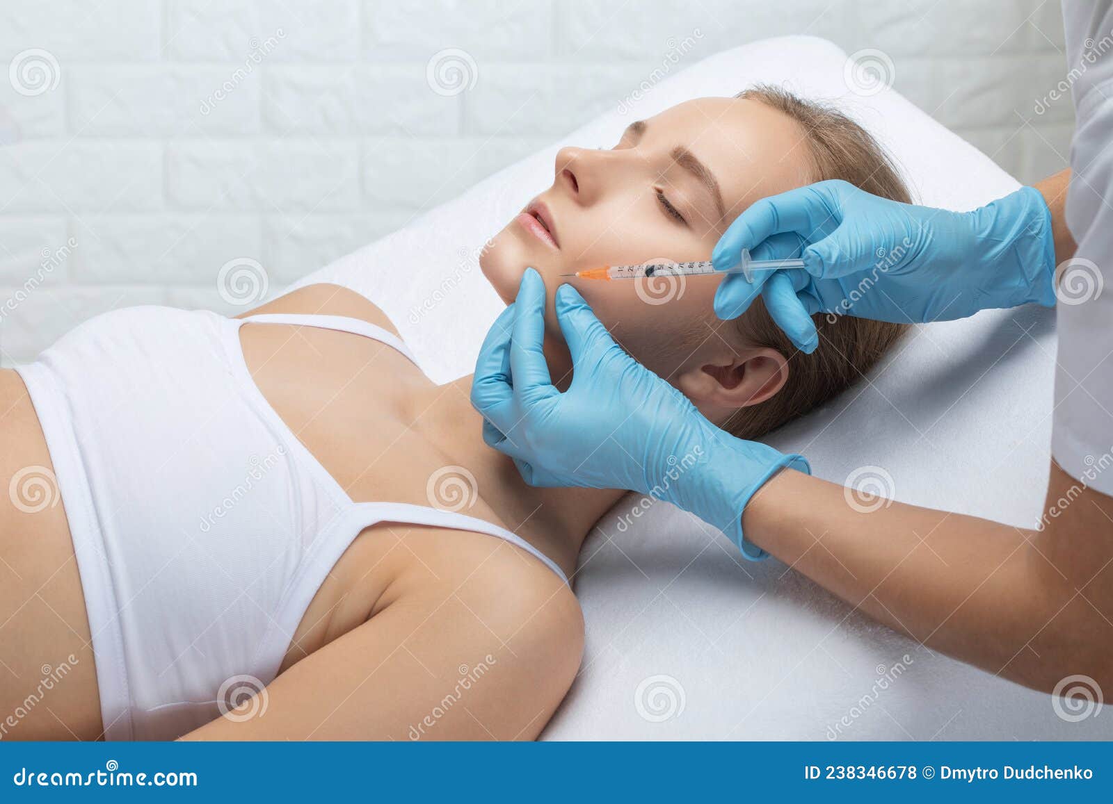 Cosmetologist Makes Rejuvenating Anti Wrinkle Injections On The Face Of