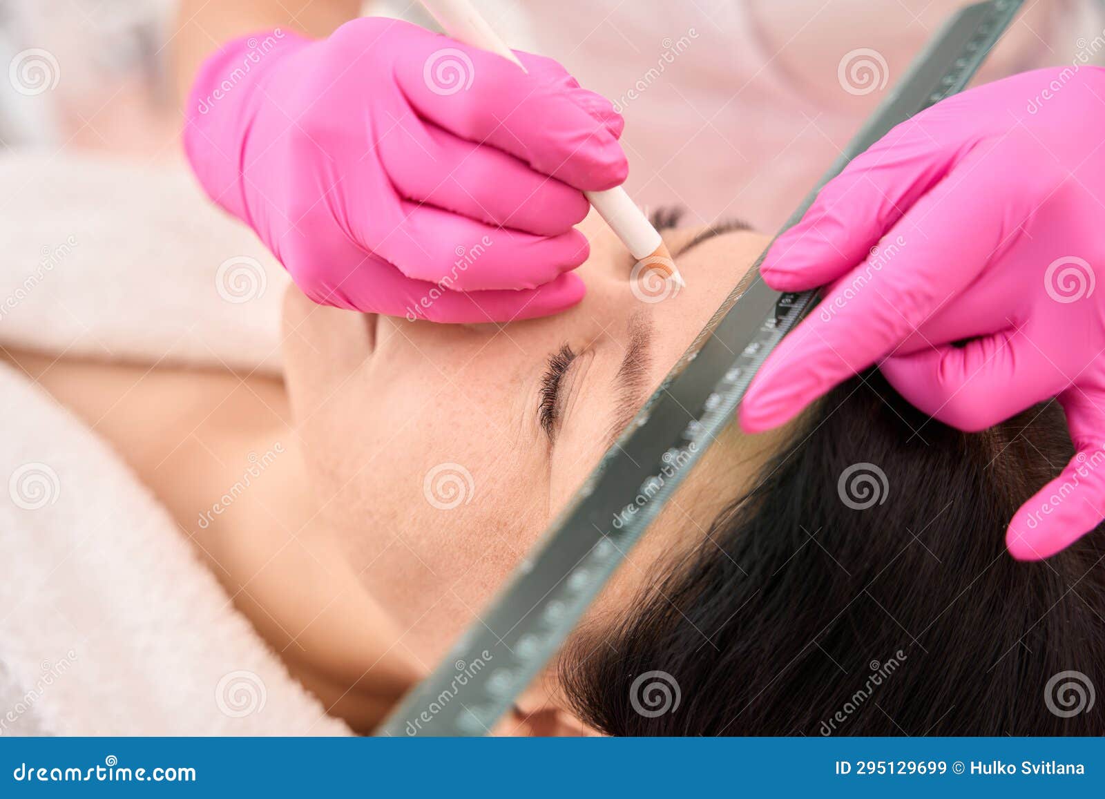Cosmetologist Marks the Clients Eyebrows before the Procedure Stock ...