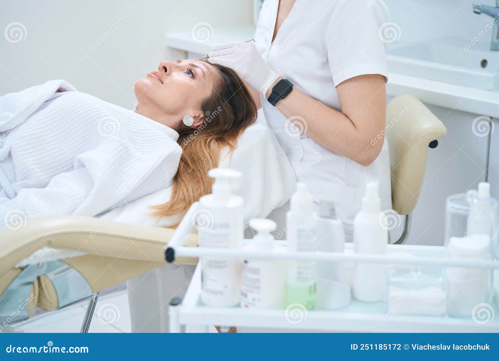 Cosmetologist Makes Mechanical Cleaning of the Skin with an Uno Spoon ...