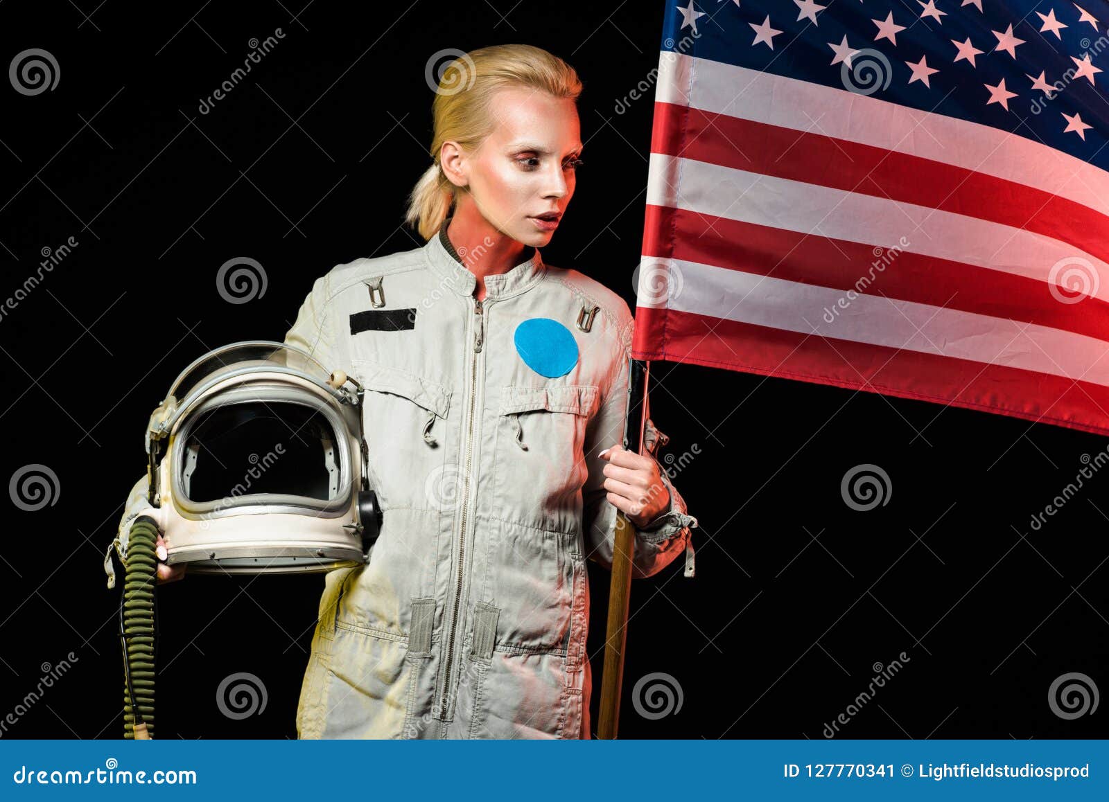 Cosmonaut in Spacesuit Holding Helmet and American Flag Stock Image ... Cosmonaut in Spacesuit Holding Helmet and American Flag Stock Image ...