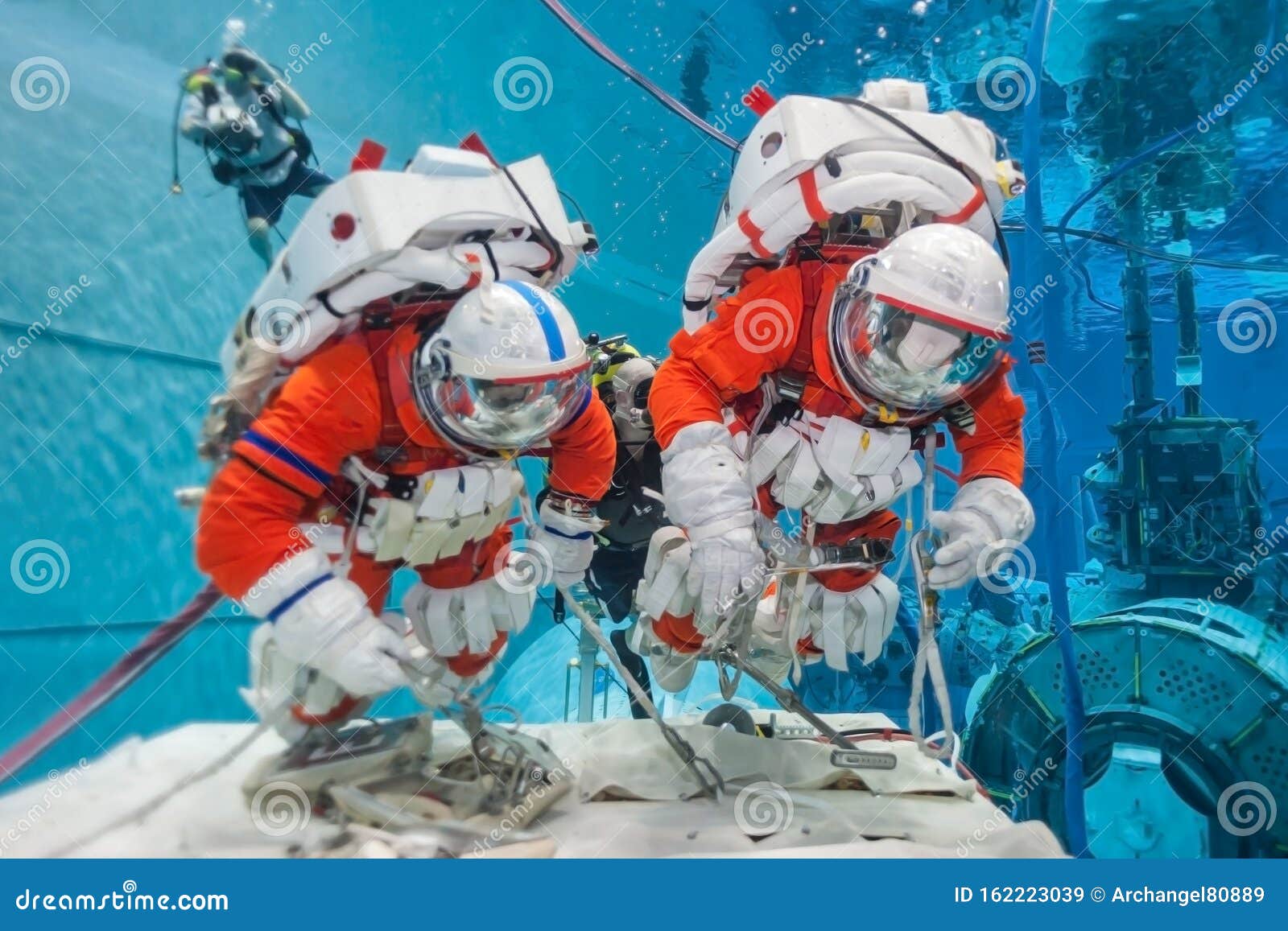 Cosmonaut Training in the Pool, in Spacesuits. Elements of this Image ...