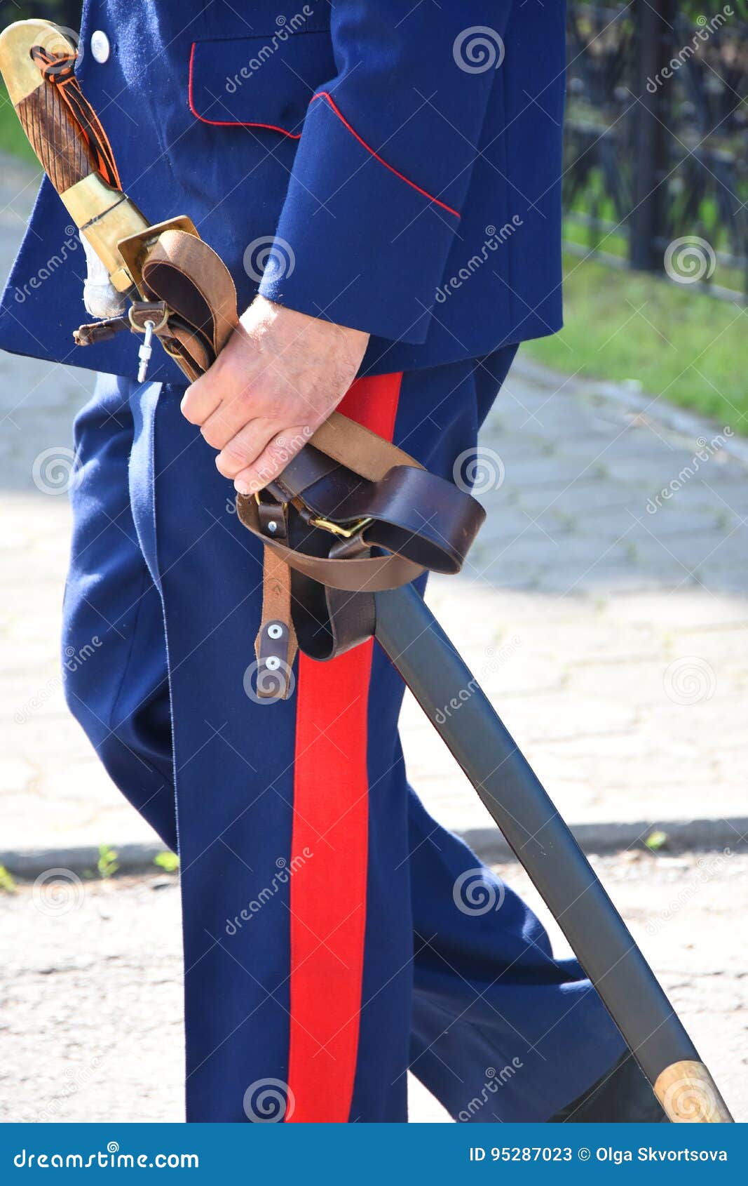 Cossack Saber With A Wooden Handle On The Green Grass, Cold Weapon Of ...