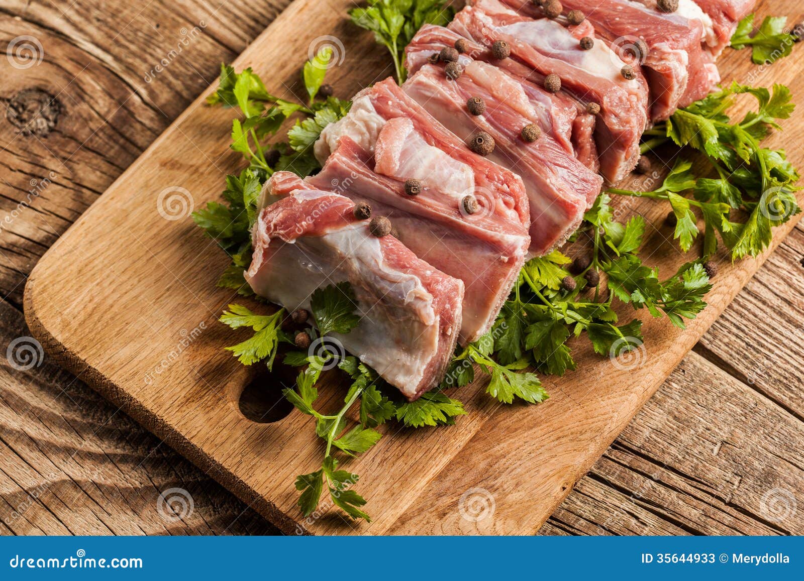 Costillas de cerdo crudas imagen de archivo. Imagen de cadena - 35644933