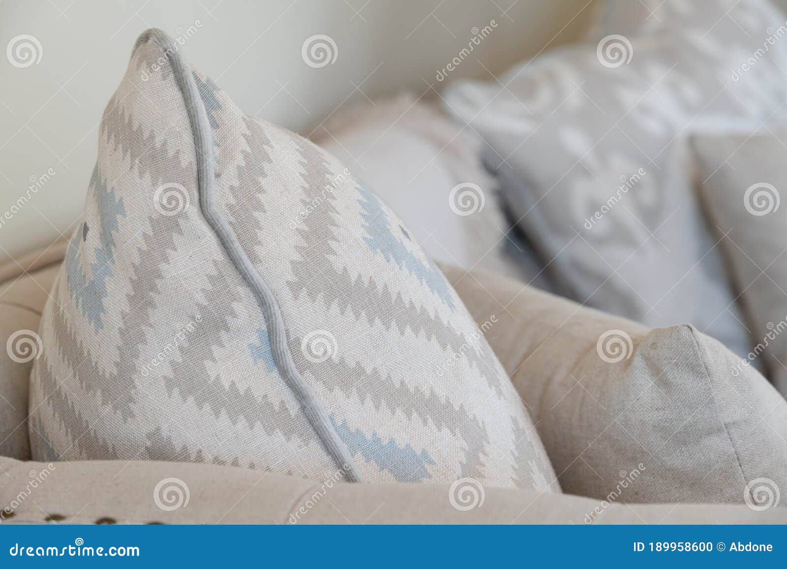 Cosy Patterned Cushions on a Bed Stock Photo - Image of bright, plaid ...