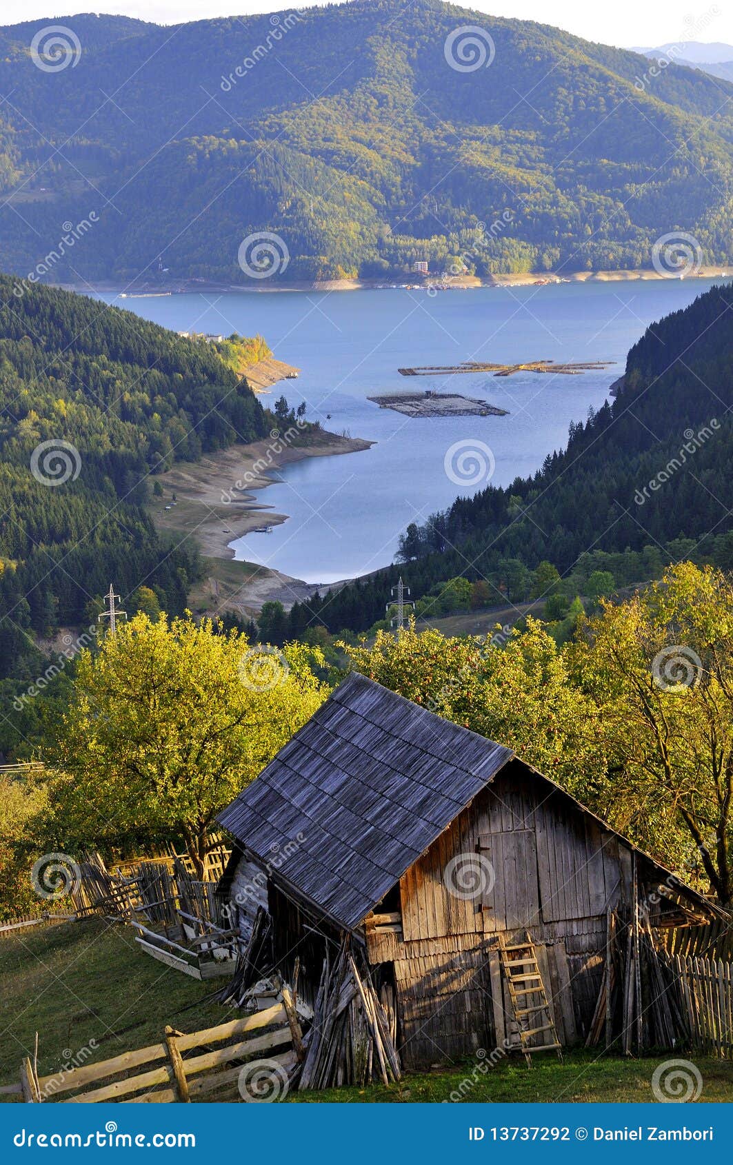 Cottage at mountain lake stock photo. Image of autumn - 13737292