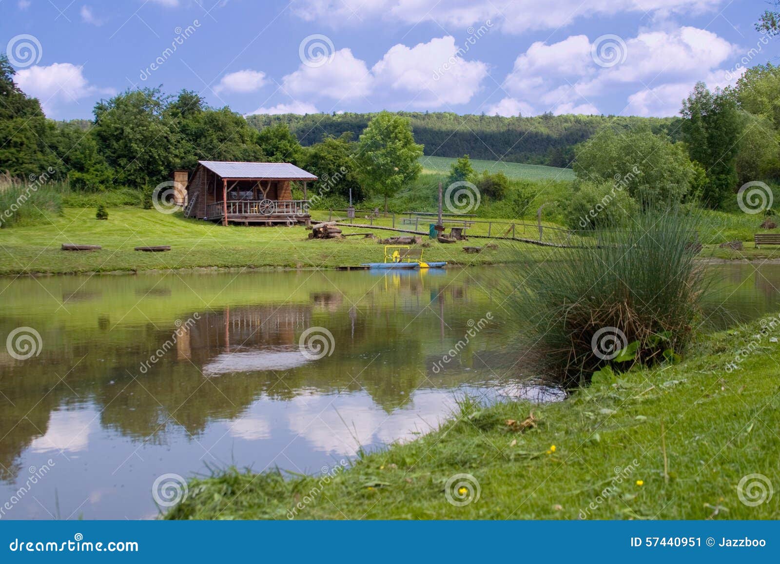 Cottage at a pond stock image. Image of trees, blue, countryside - 57440951