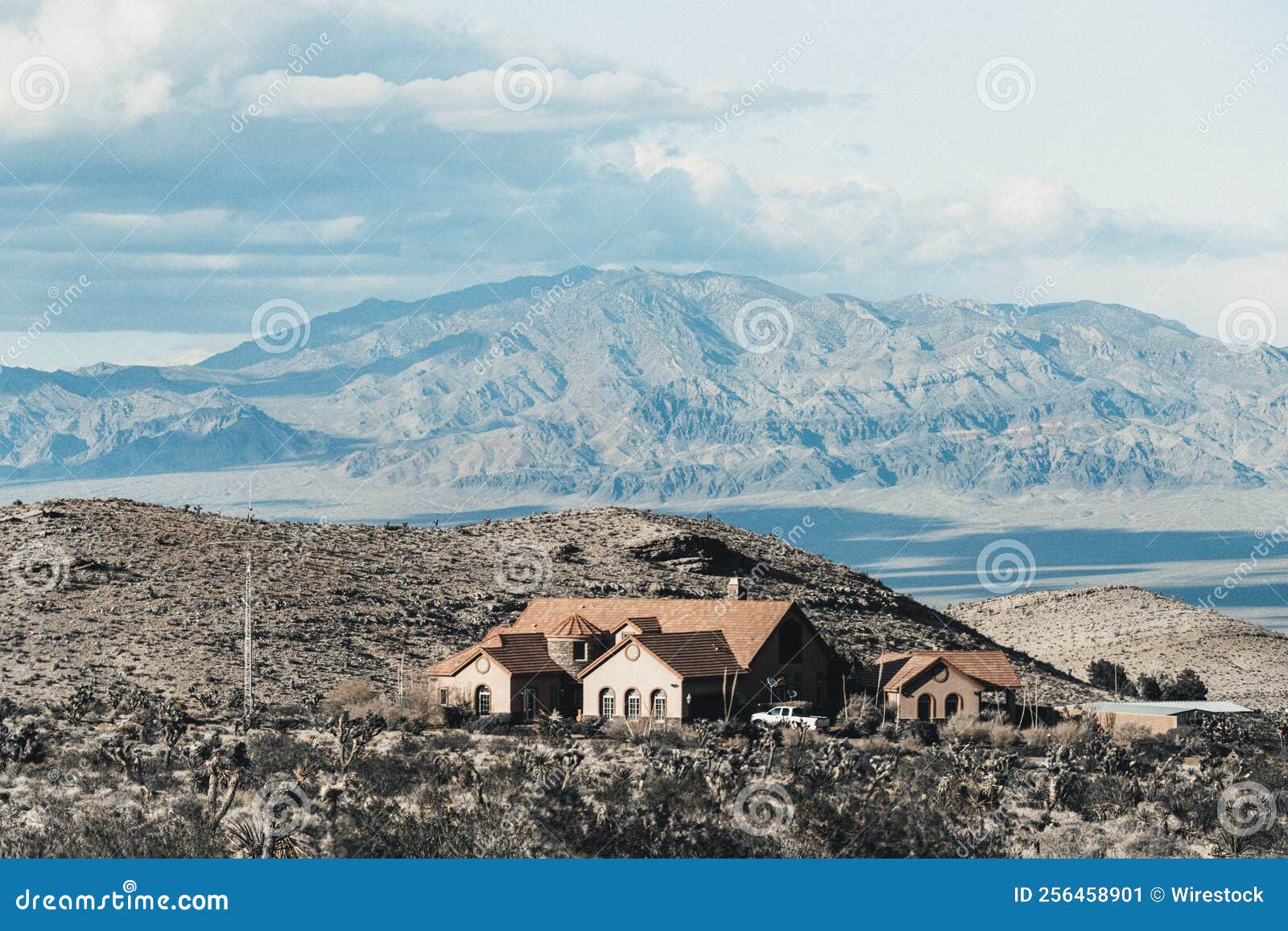 Cottage Resort on a Field with a Background of Mountains Stock Image ...
