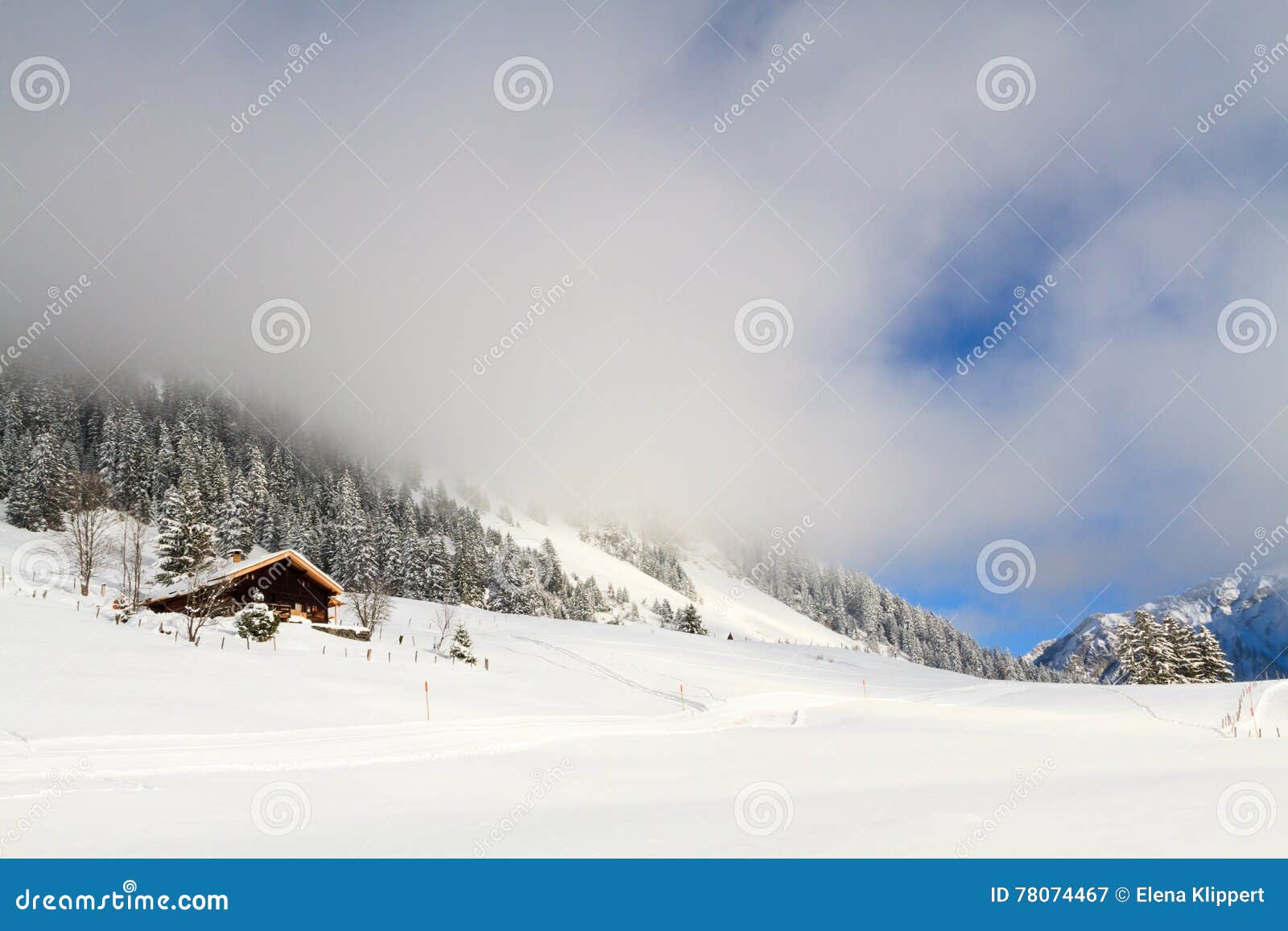 Cottage in the Swiss Alps. stock image. Image of wintery - 78074467