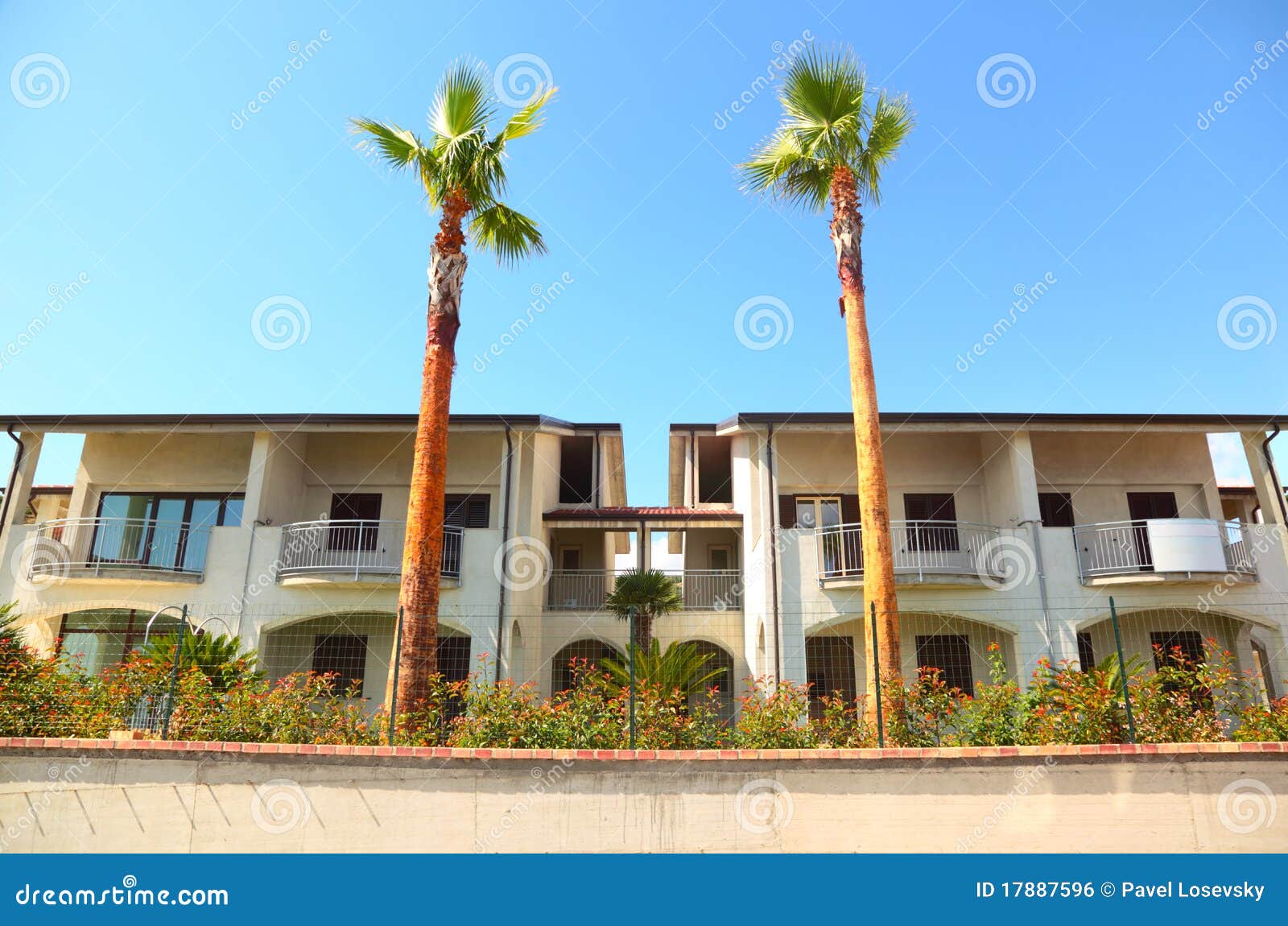 Cottages with Balcony and Garden with Palm Trees Stock Photo - Image of ...