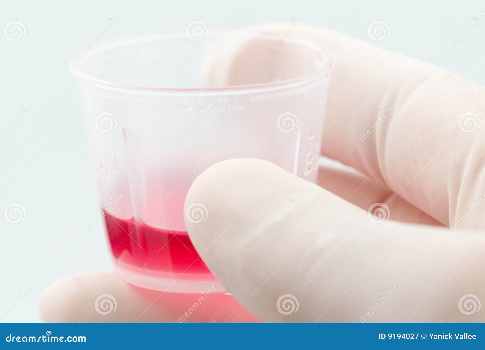 Cough Syrup in Cup Held by Medical Professional Stock Image - Image of ...