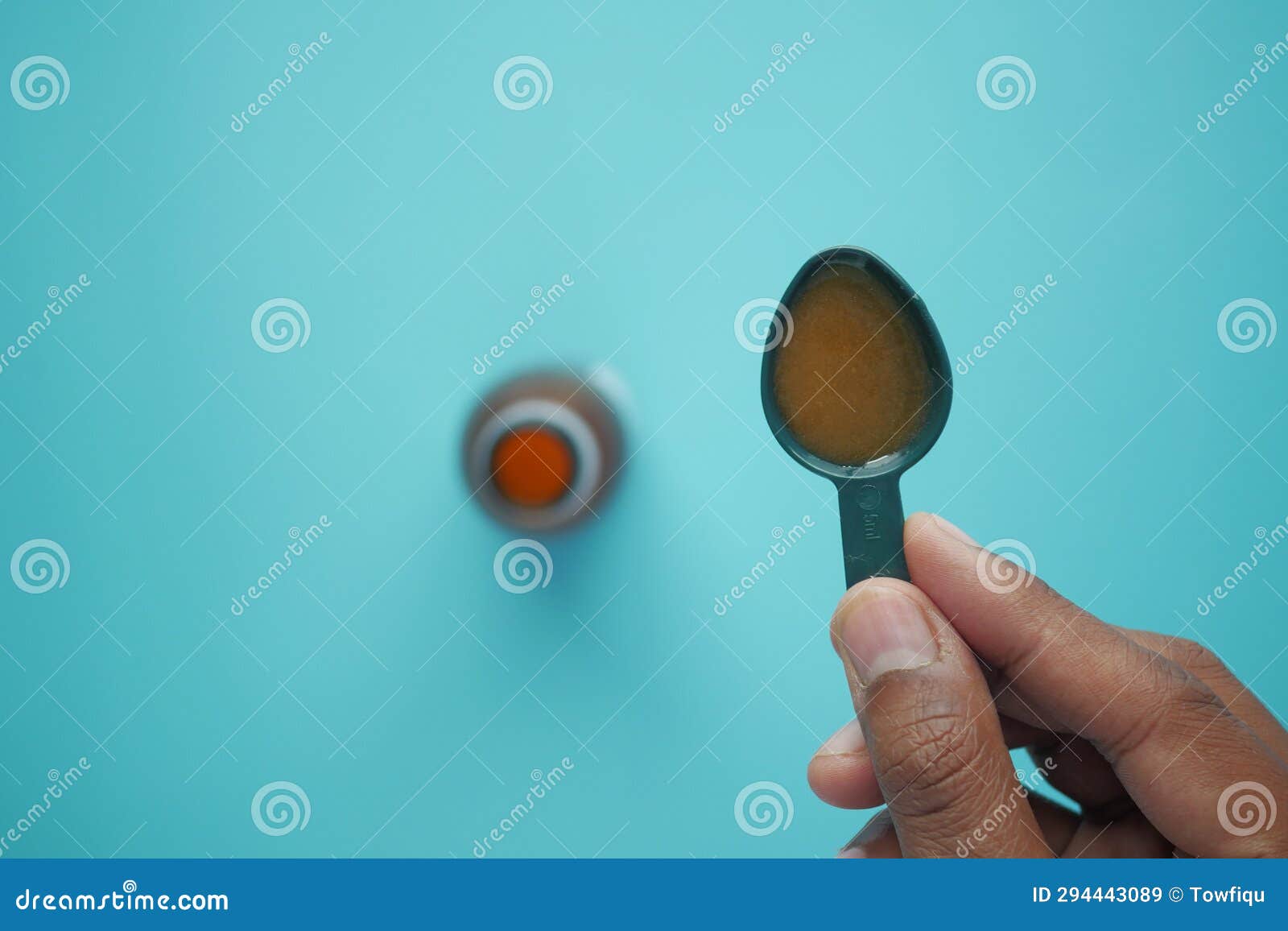 Cough syrup on a spoon stock image. Image of vitamin - 294443089