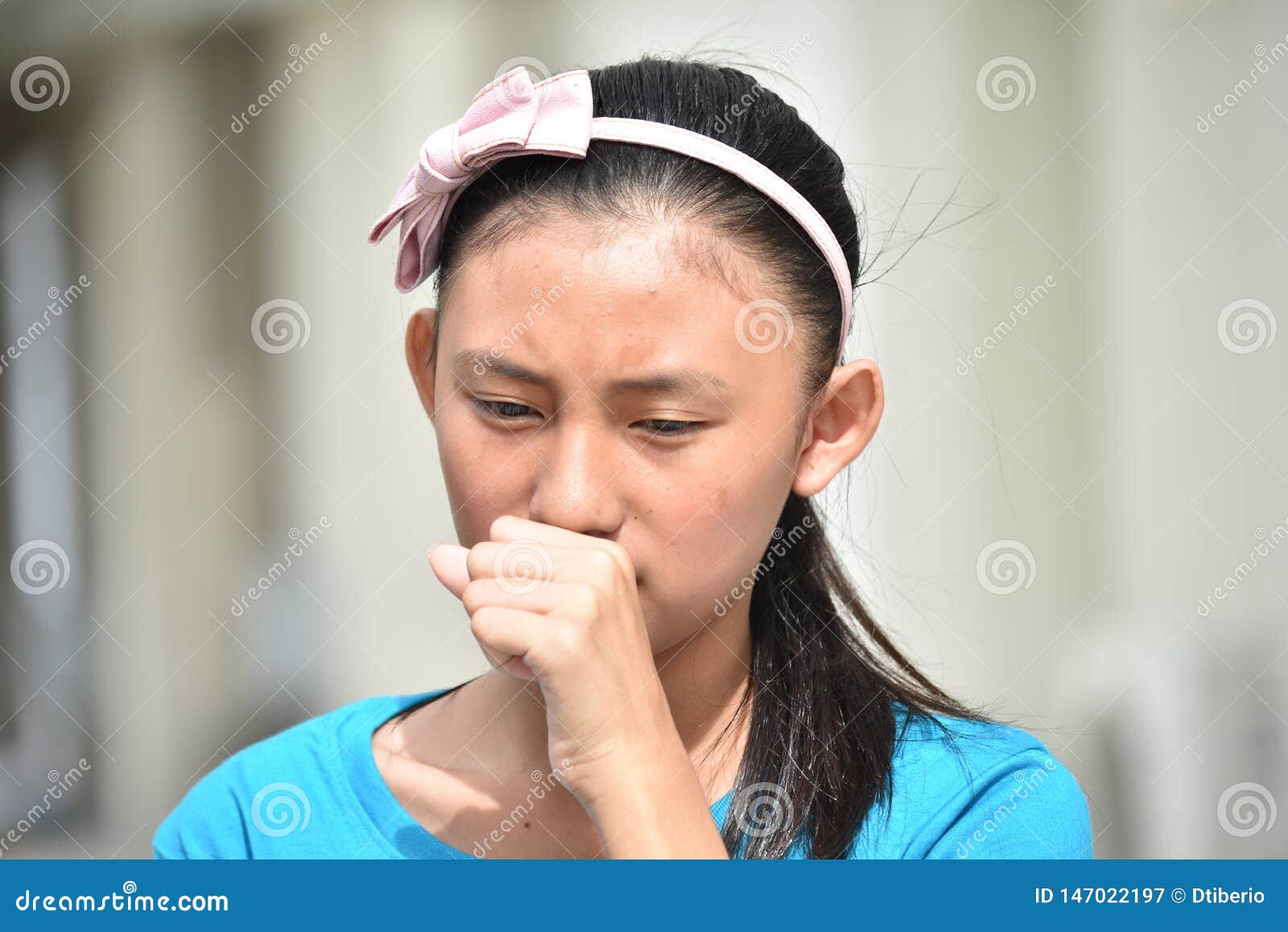 A Coughing Filipina Girl stock image. Image of pretty - 147022197