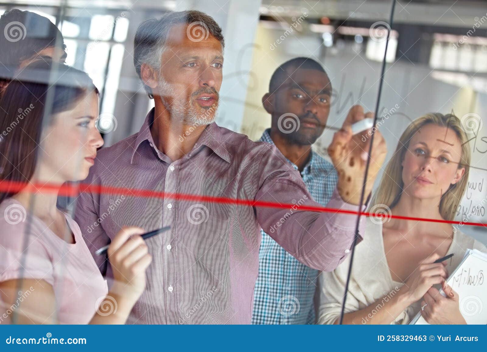 Could this Work. a Group of Business Associates Brainstorming Together ...