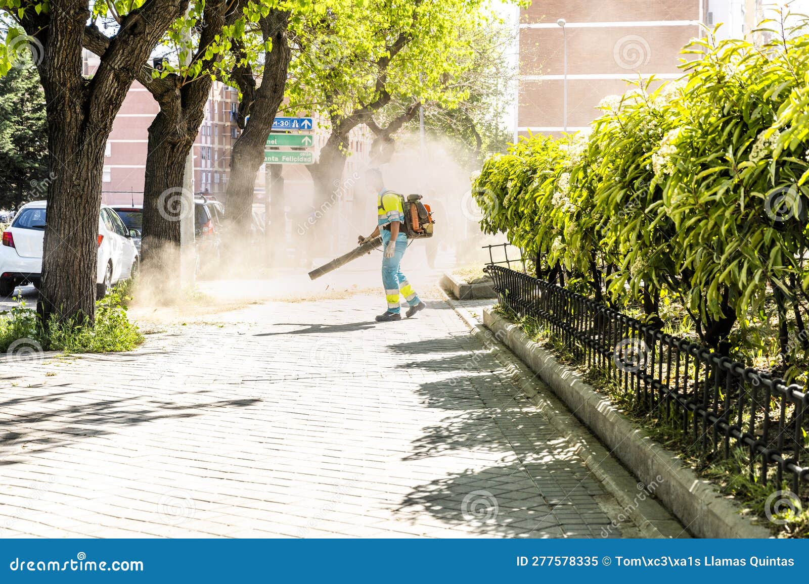 A Council Worker Clearing the Sidewalks of Leaves Stock Image - Image ...