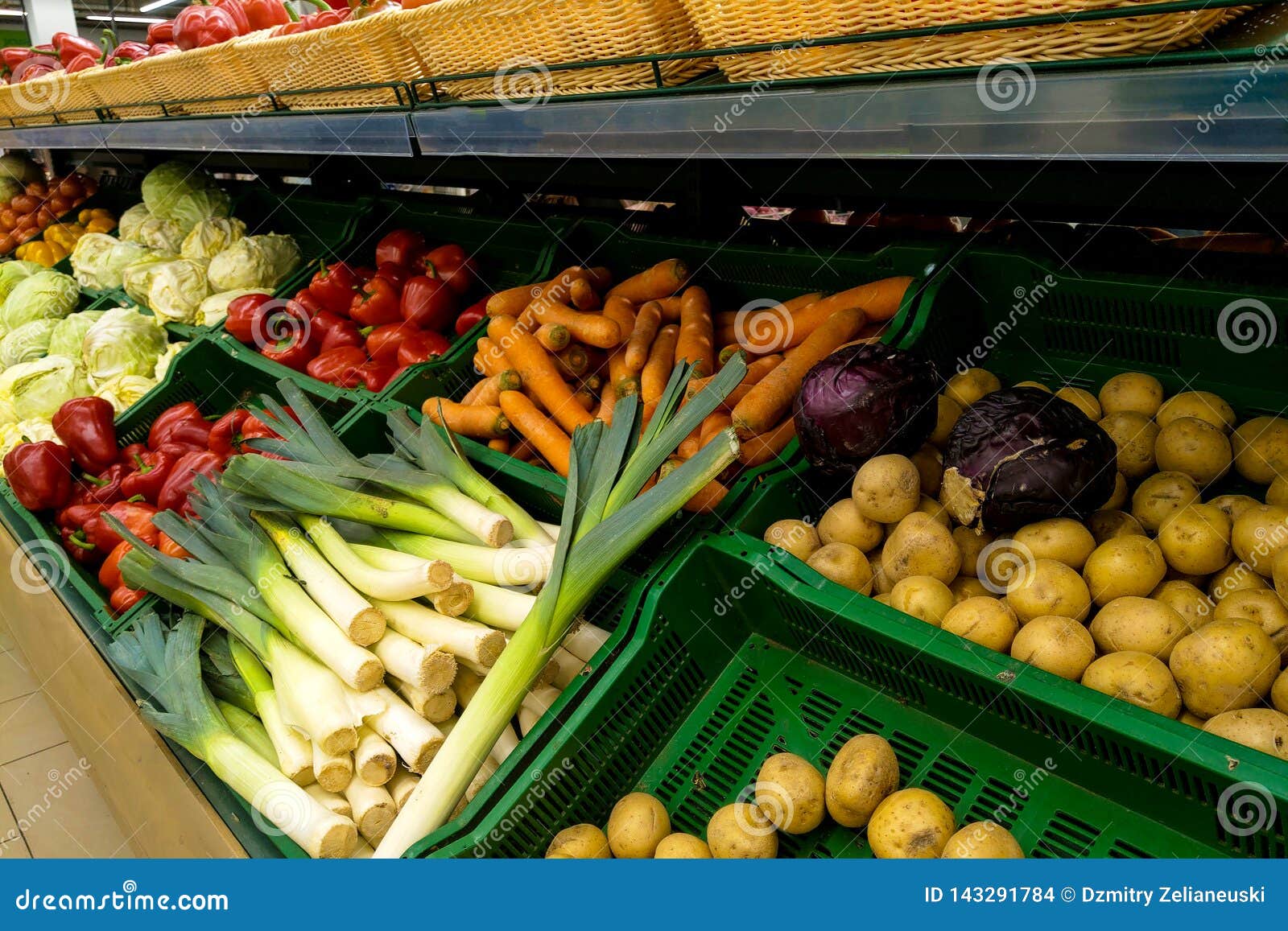 A Counter of Different Vegetables at the Grocery Store Stock Photo ...