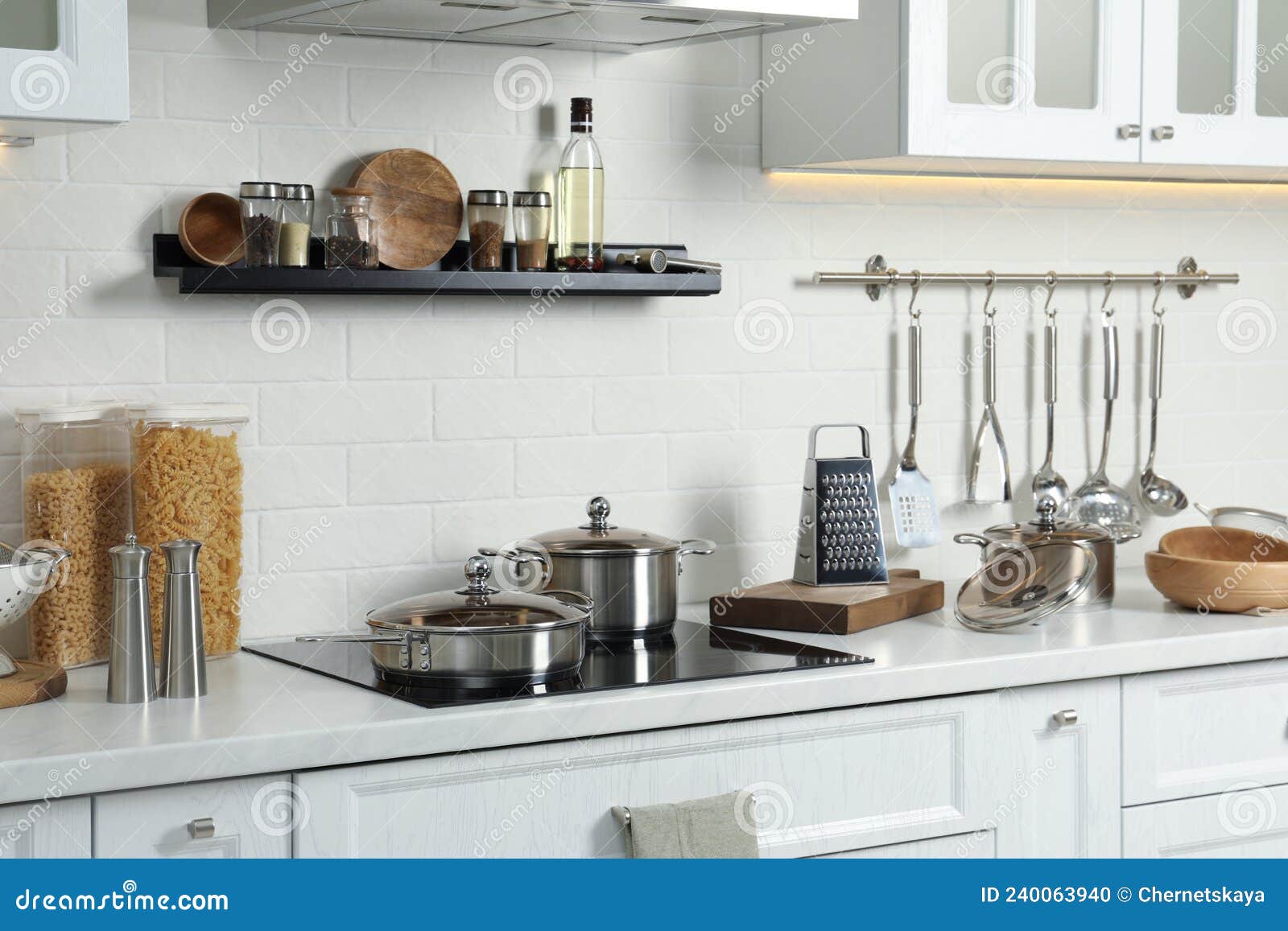 Countertop with Different Cooking Utensils in Kitchen Stock Photo ...