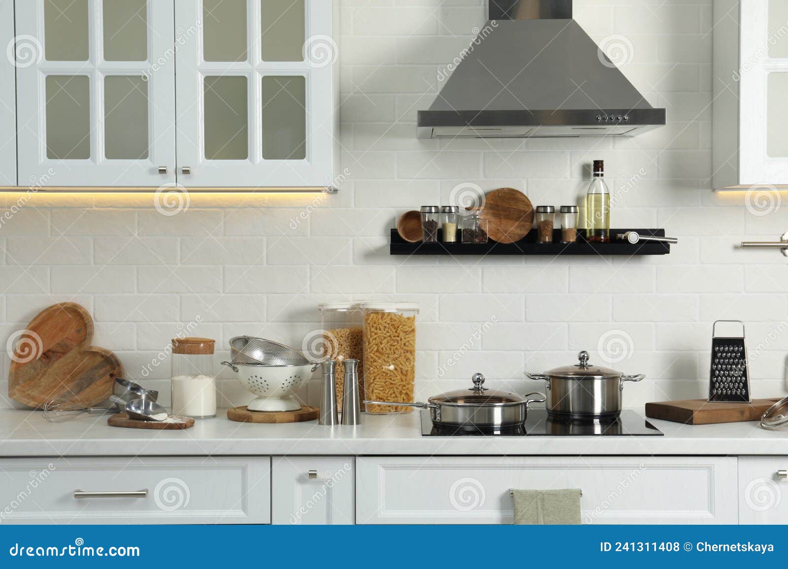 Countertop with Different Cooking Utensils in Kitchen Stock Photo ...