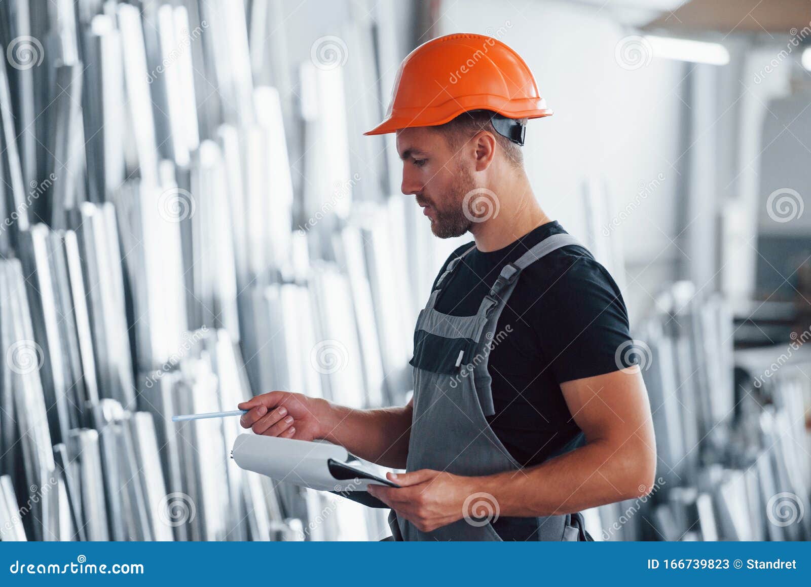 Counting and Checking Objects in the Storage. Industrial Worker Indoors ...