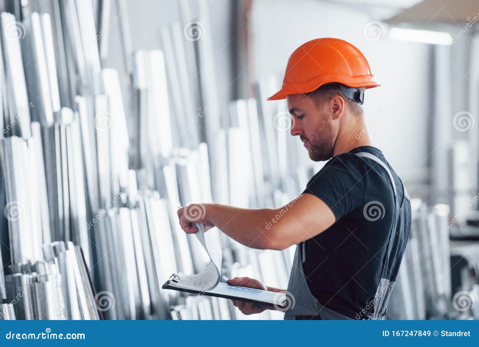 Counting and Checking Objects in the Storage. Industrial Worker Indoors ...