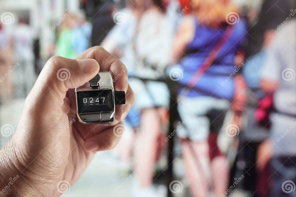 Counting People with Hand Held Tally Counter Counting Headcount of ...