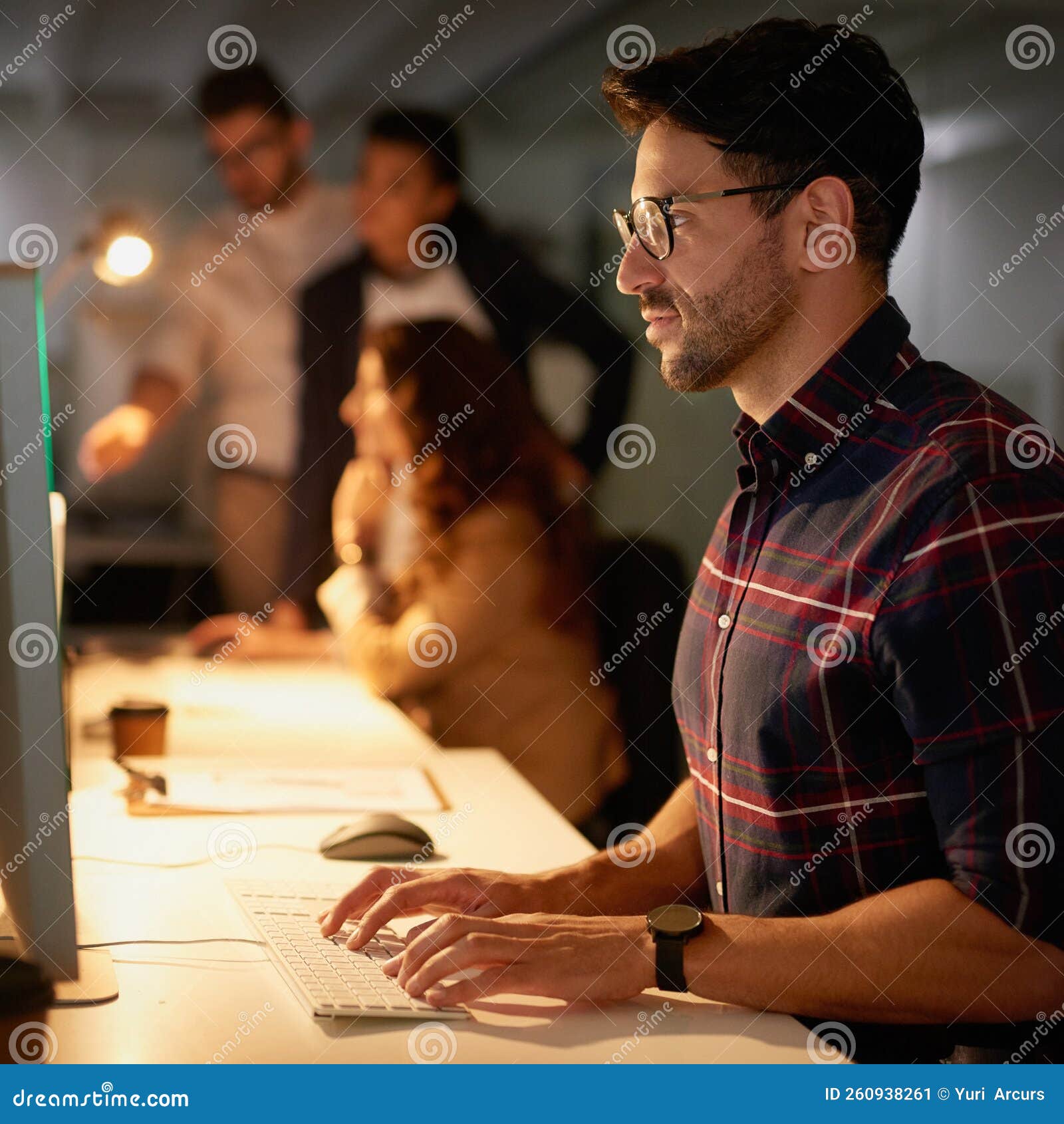 Counting on Some Late-night Inspiration. a Group of Businesspeople ...