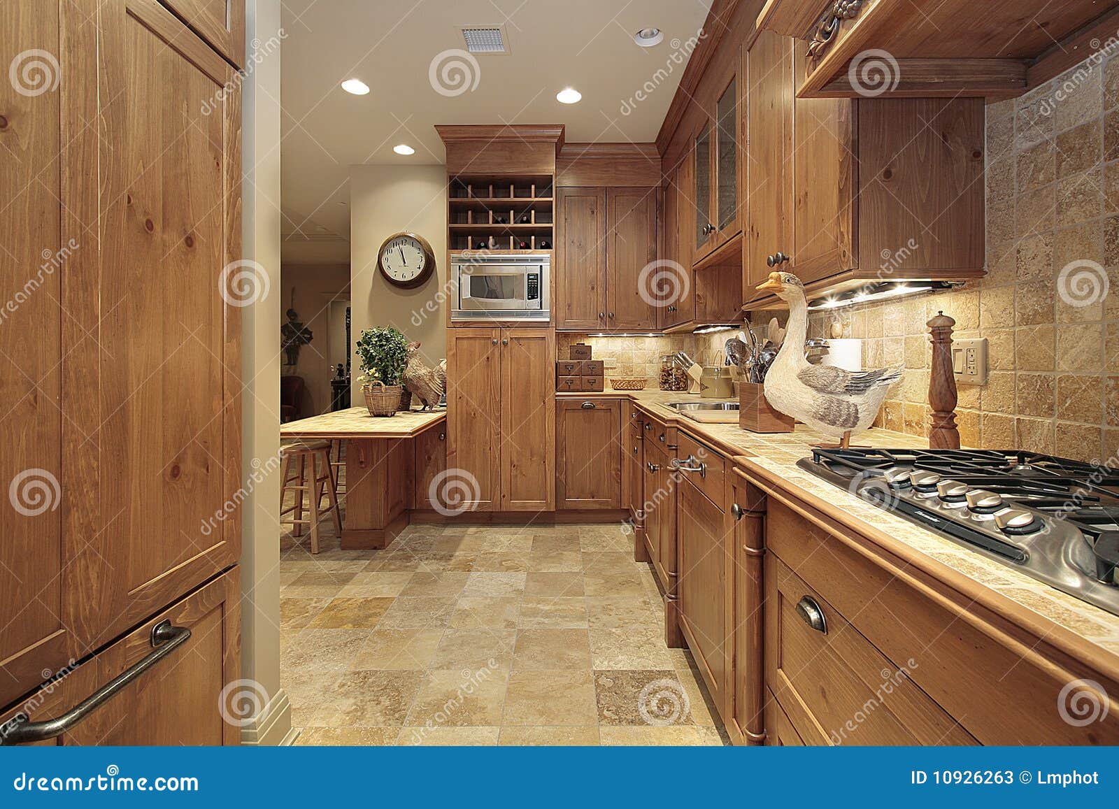 Country Kitchen with Oak Cabinetry Stock Image - Image of decor, island ...