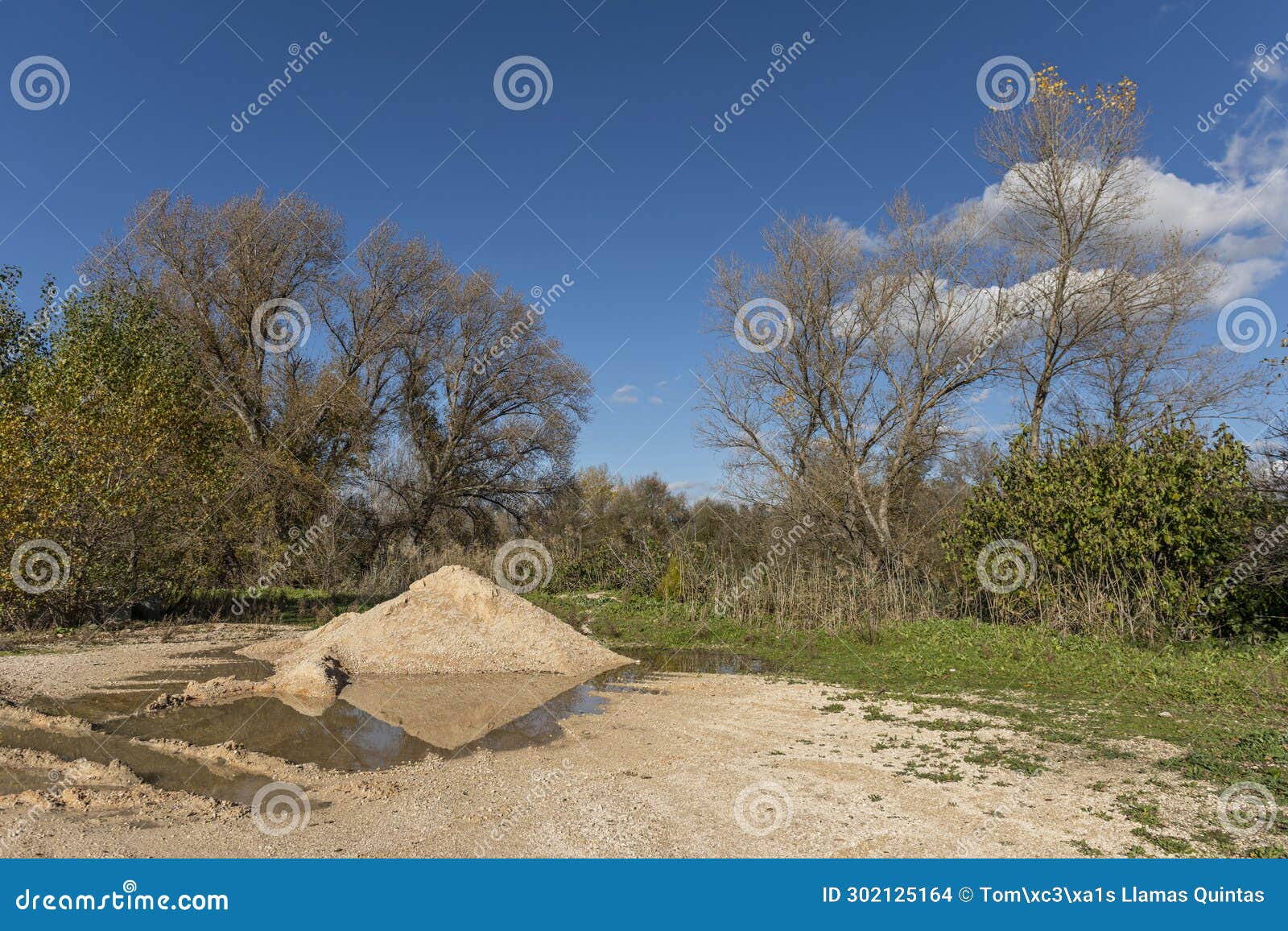 A Country Landscape with a Mound of Sand Stock Photo - Image of trees ...
