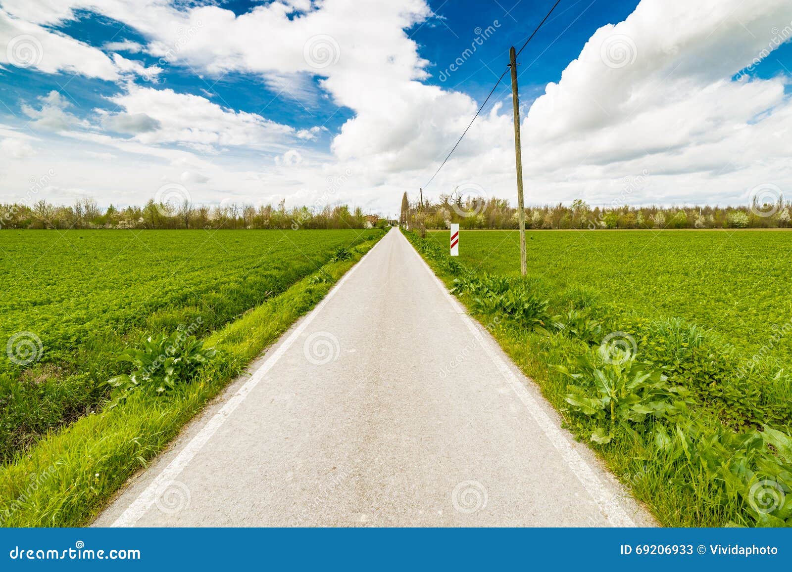 Country Road Running through Green Fields Stock Image - Image of ...