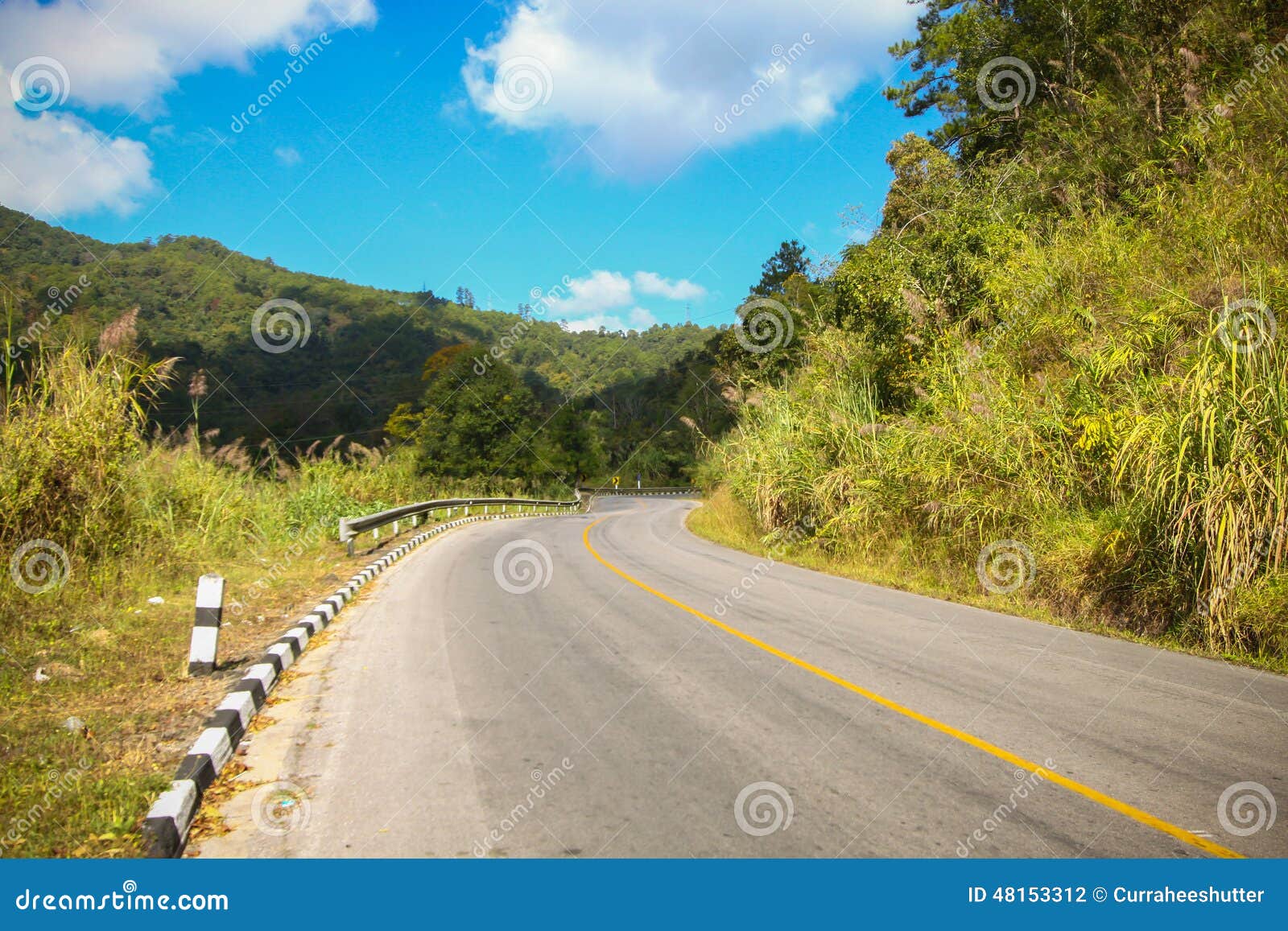 A Country Road Running through Green Fields.winding Road. Stock Photo ...