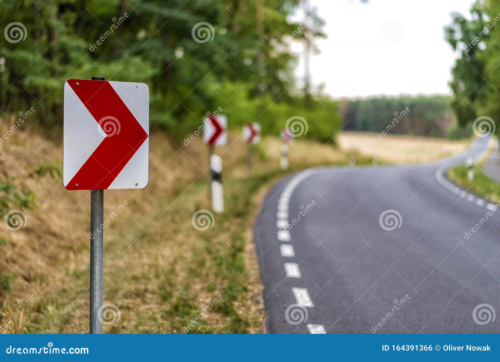 Country Road with a Sharp Turn Stock Photo - Image of barrier, danger ...