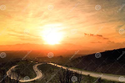 Country road during sunset stock image. Image of bend - 5149713