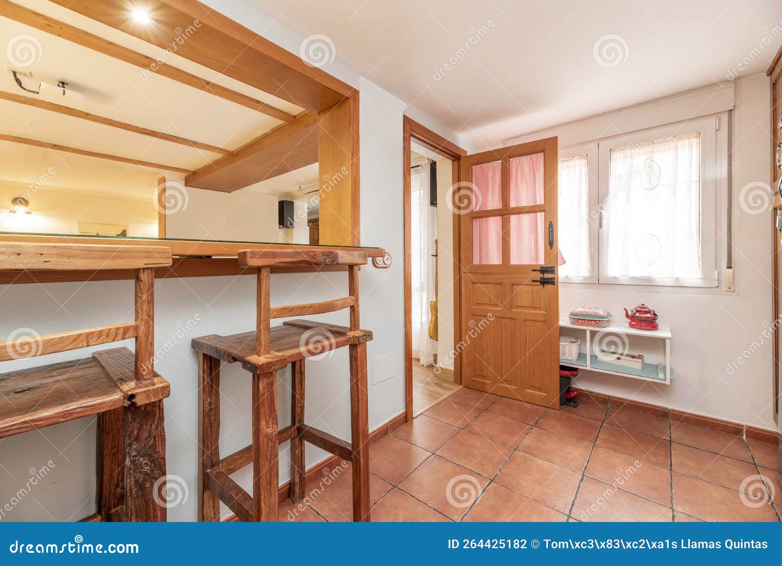 Country-style Kitchen with Serving Hatch with Wooden Bar and High ...