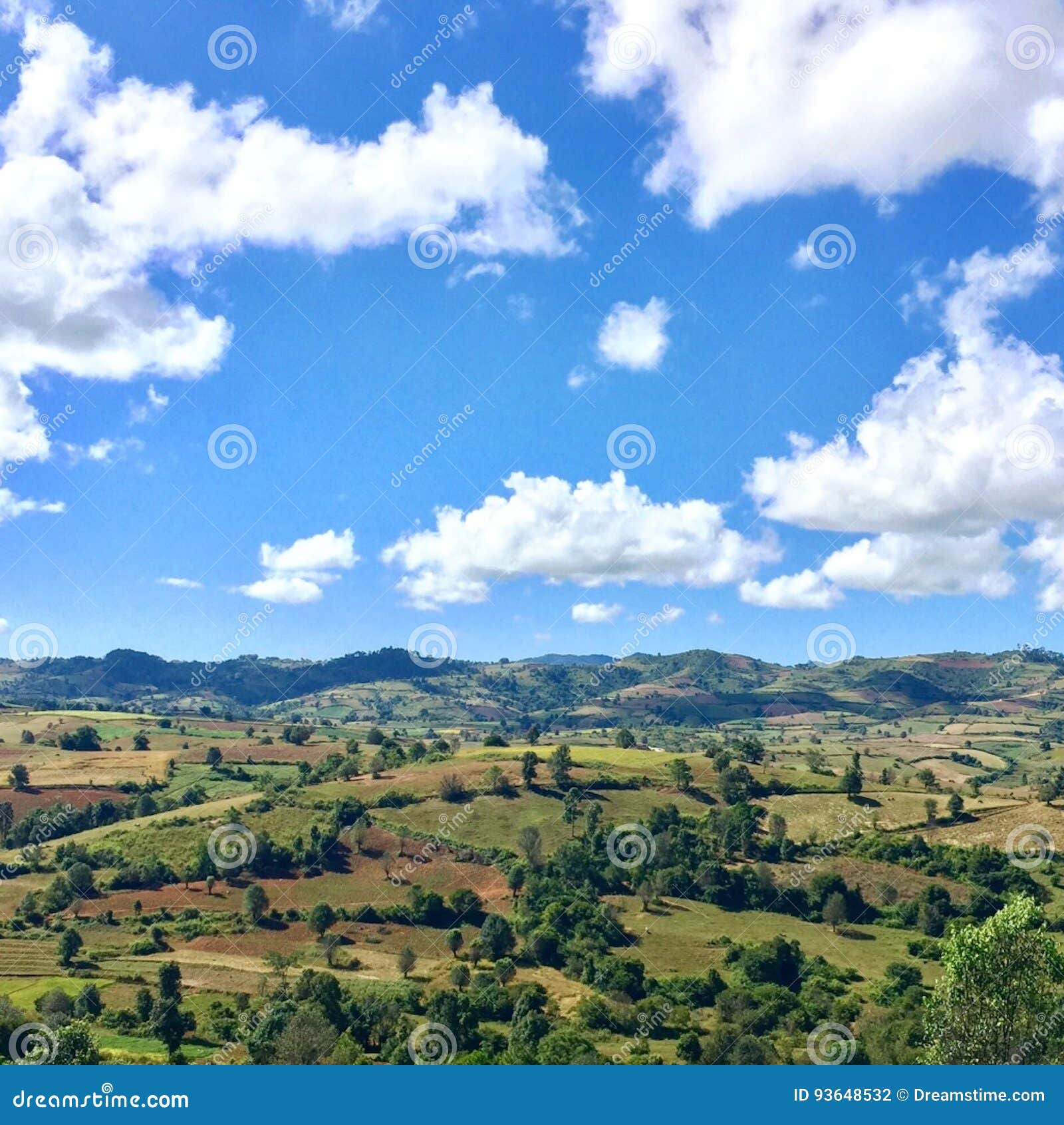 Countryside and blue sky stock photo. Image of blue, fields - 93648532