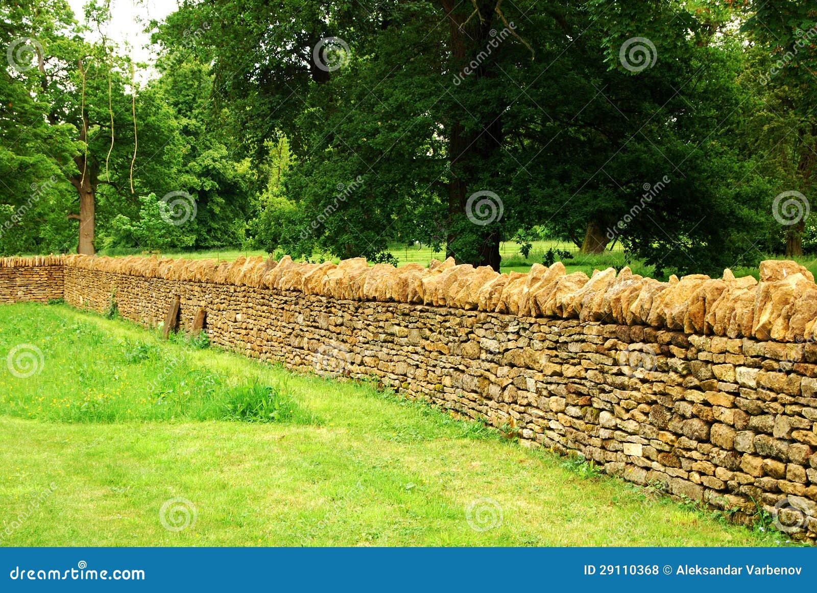 Countryside Garden, Stone Wall Stock Photo - Image of masonry, lawn ...