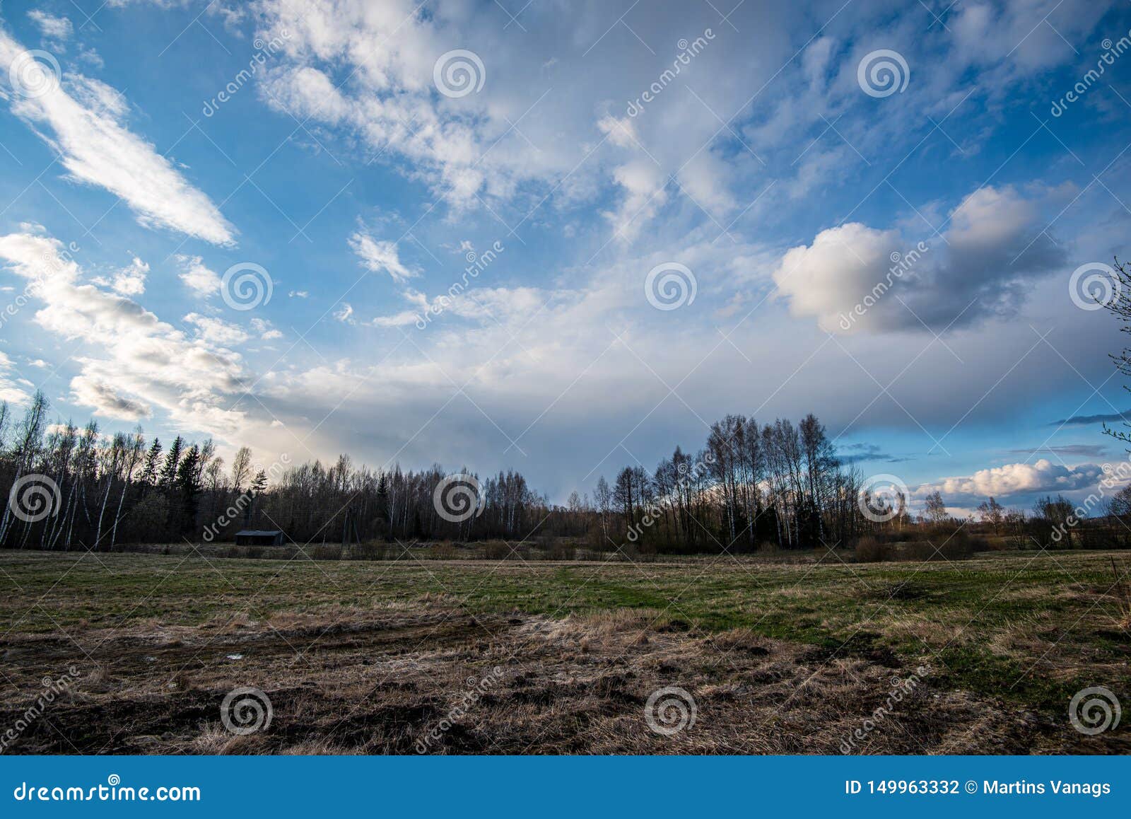 Countryside Landscape Under Blue Sky and Dramatic White Clouds Stock ...