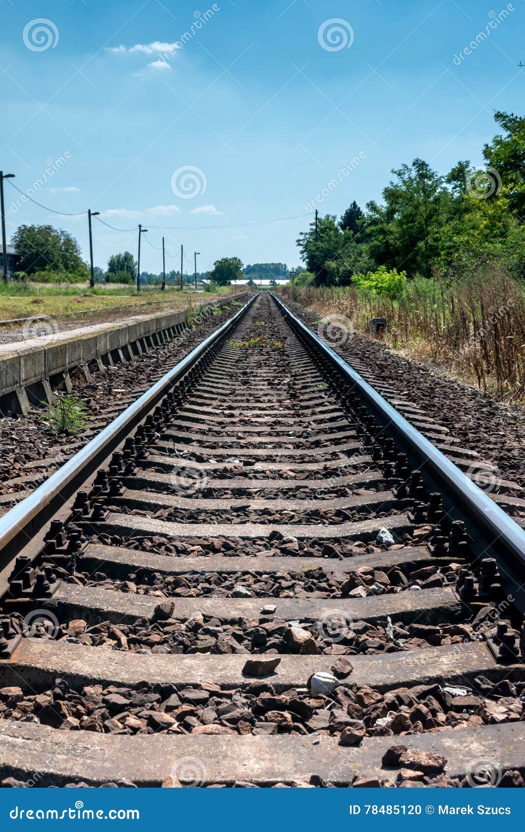 Countryside Railroad Track in Station with Platform Stock Photo - Image ...