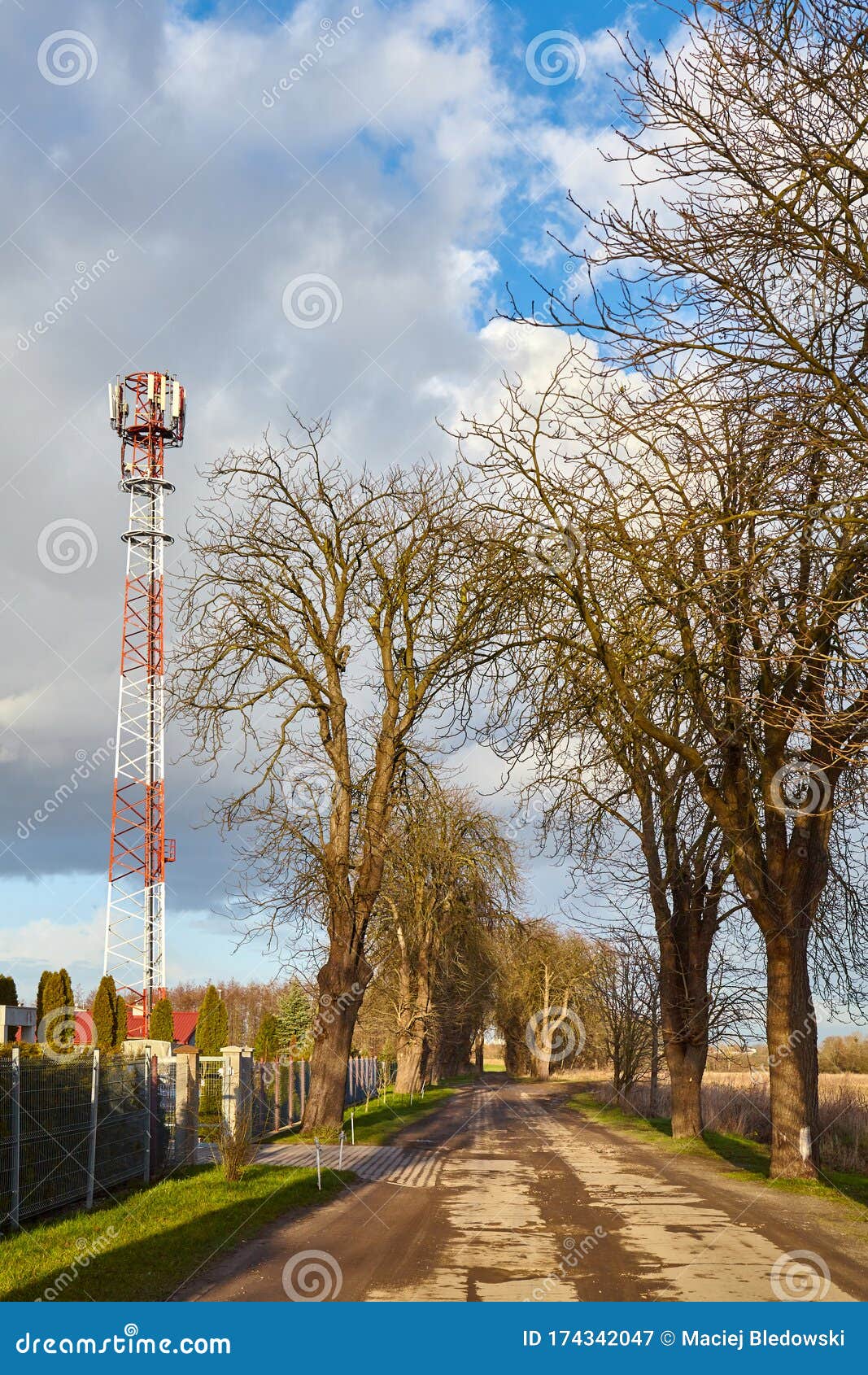 Countryside Road with Telecommunication Tower with Antennas Aside Stock ...