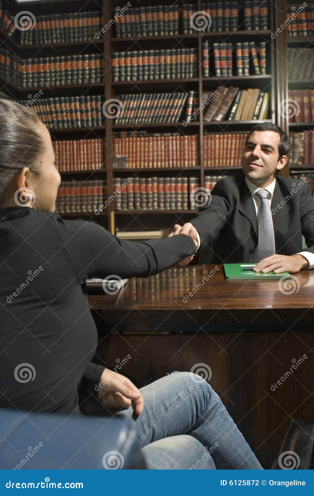 Coupe Shake Hands Over Desk - Vertical Stock Photo - Image of room ...