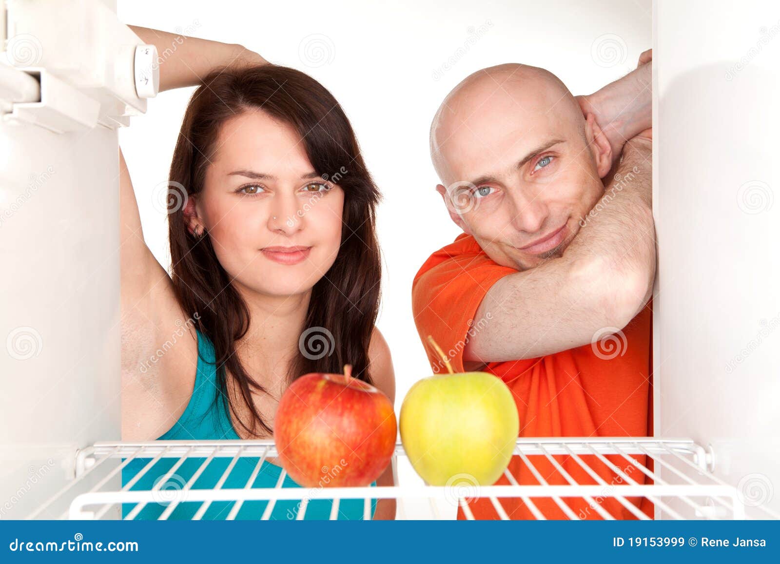 Couple with apples stock image. Image of arms, leaning - 19153999