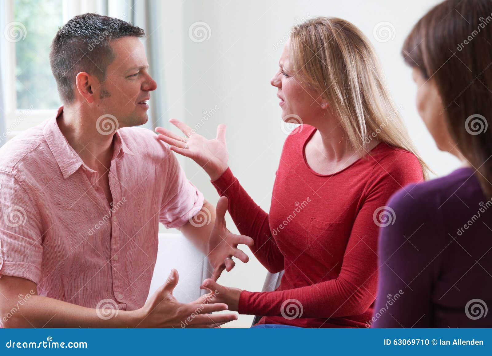 Couple Arguing in Front of Relationship Counsellor Stock Photo - Image ...