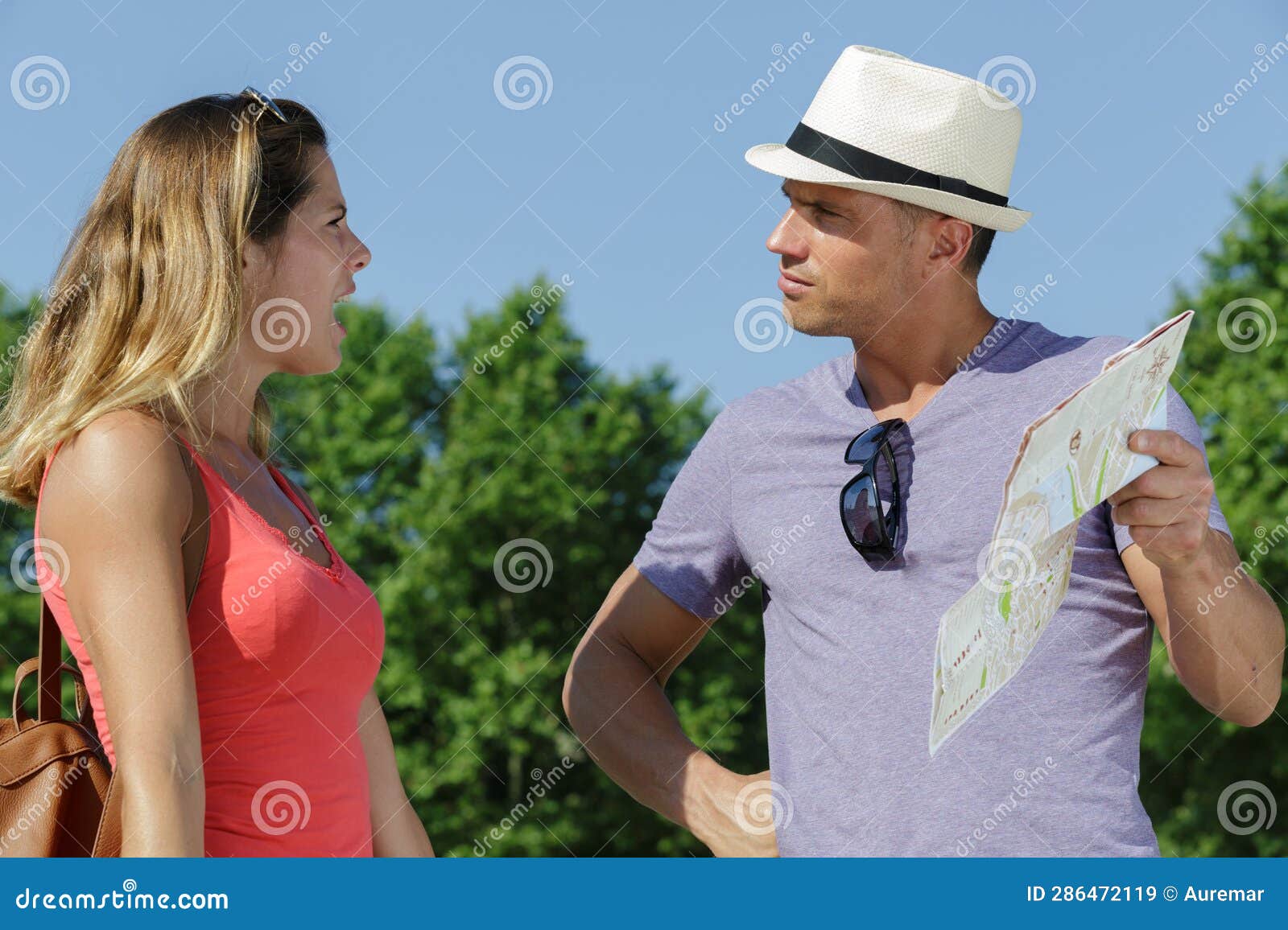 Couple arguing with map stock image. Image of ethnicity - 286472119