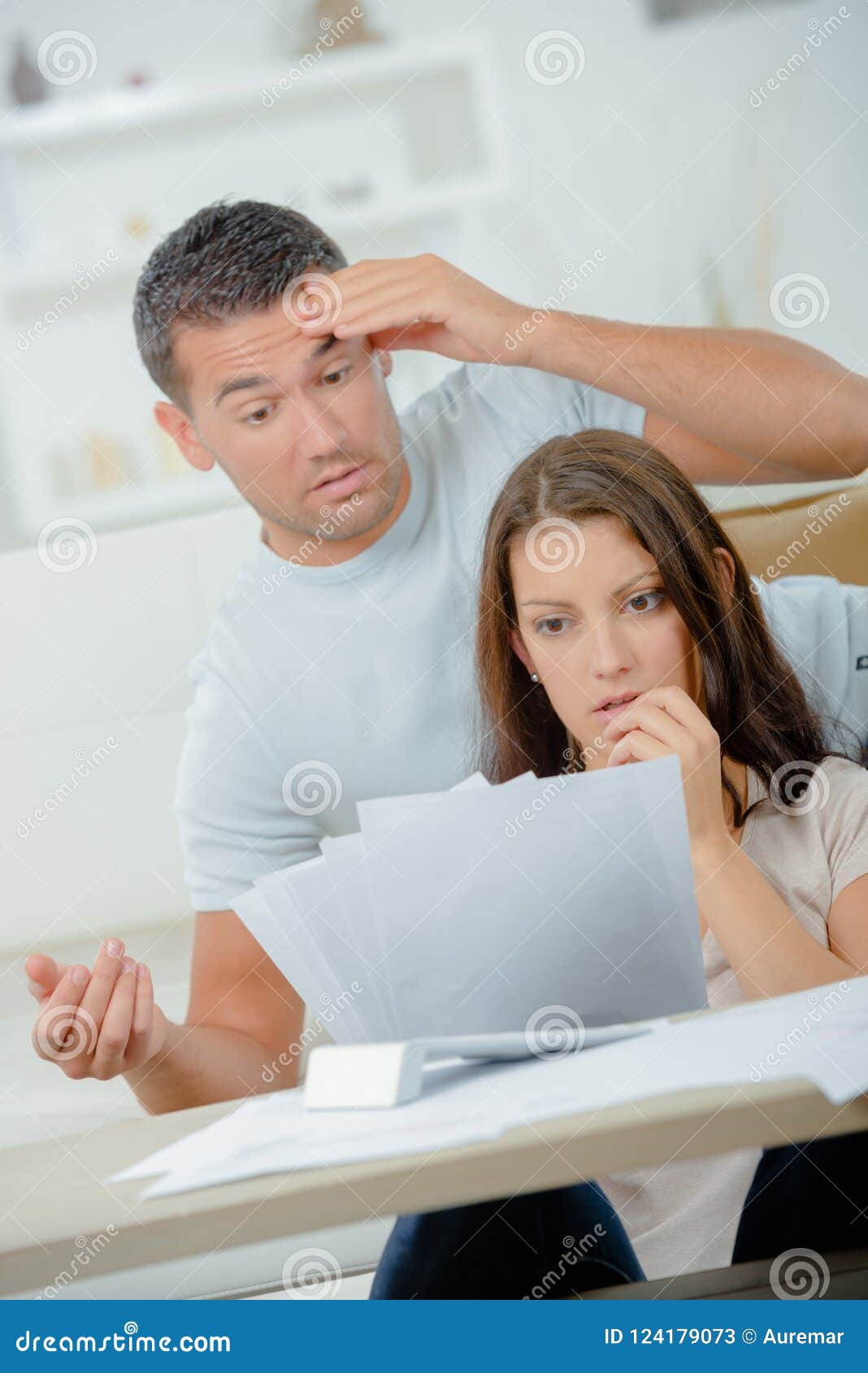 Couple arguing over bills stock image. Image of expression - 124179073