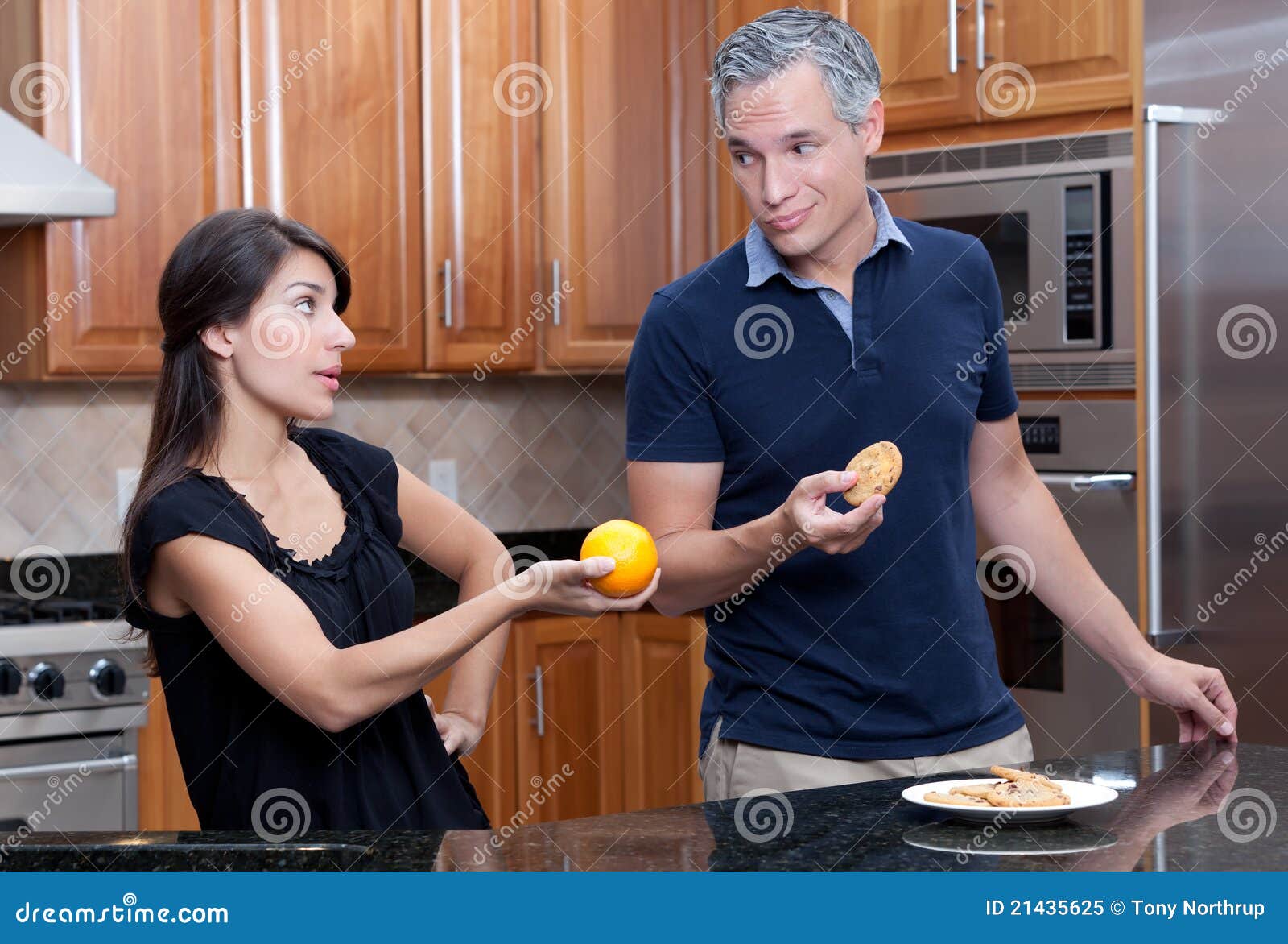 Couple arguing over diet stock image. Image of couple - 21435625