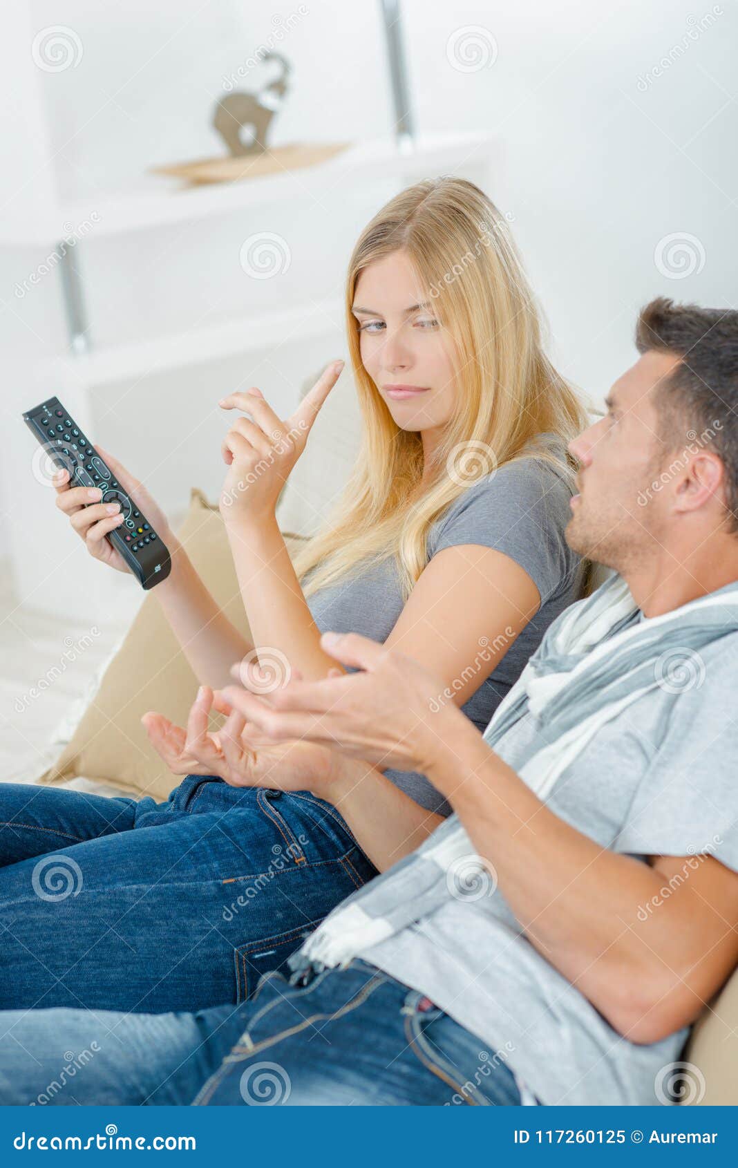 Couple Arguing Over Remote Control Stock Image - Image of love, friends ...