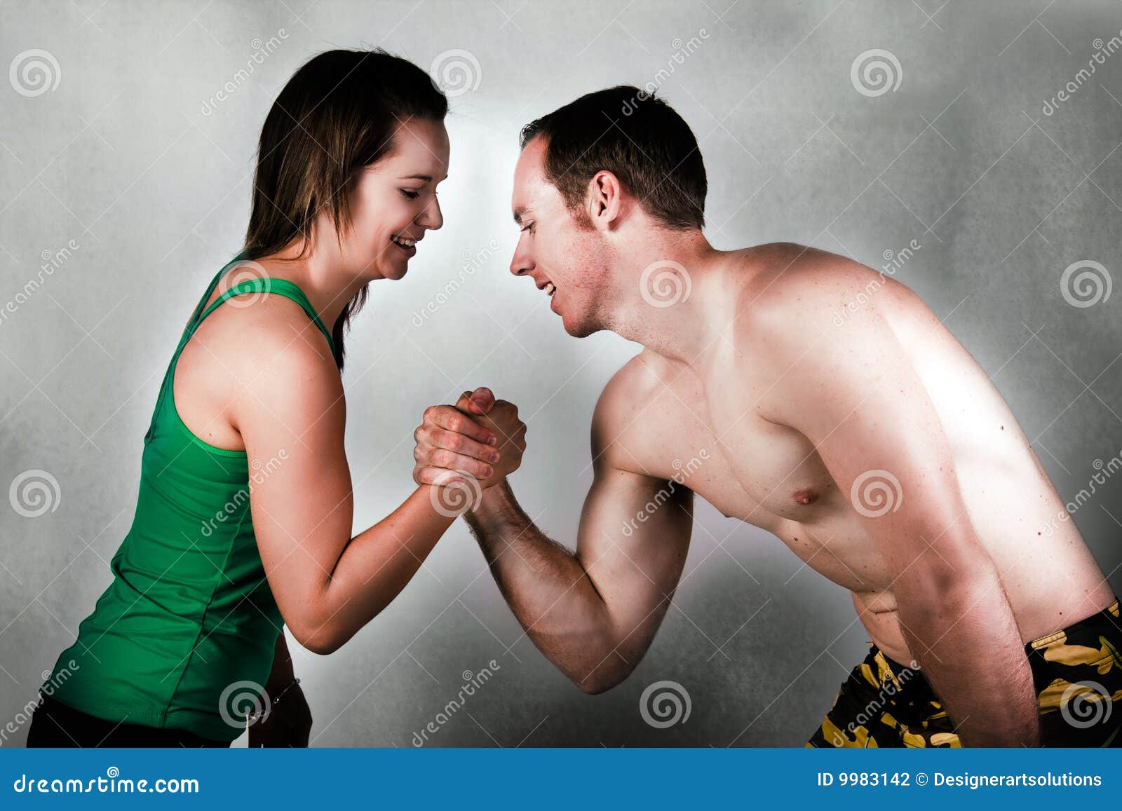 Couple arm wrestling stock photo. Image of smile, conditioning - 9983142
